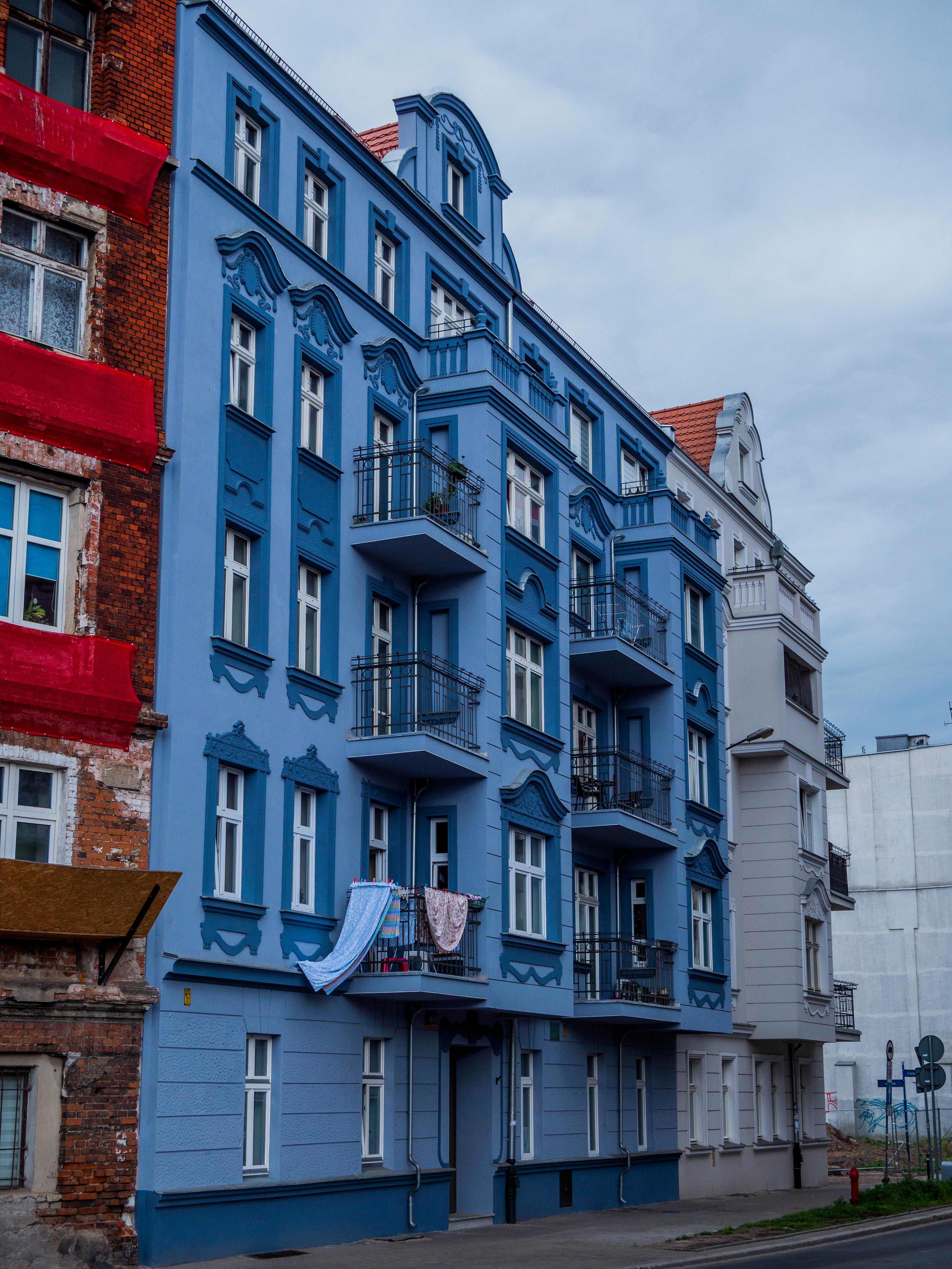 Classic Blue European Apartment Building Exterior · Free Stock Photo