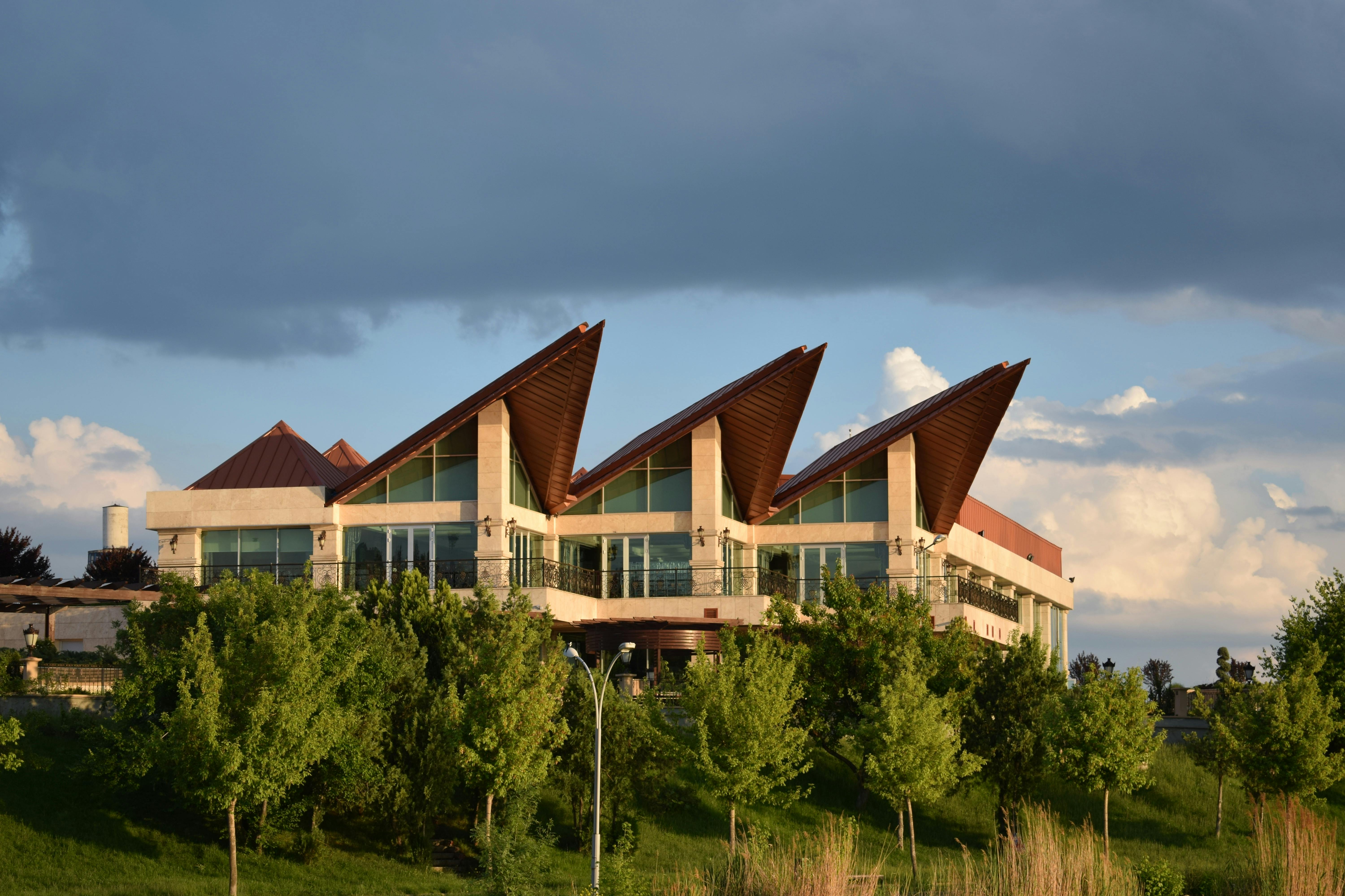 Modern Architecture Building with Triangular Roofs · Free Stock Photo