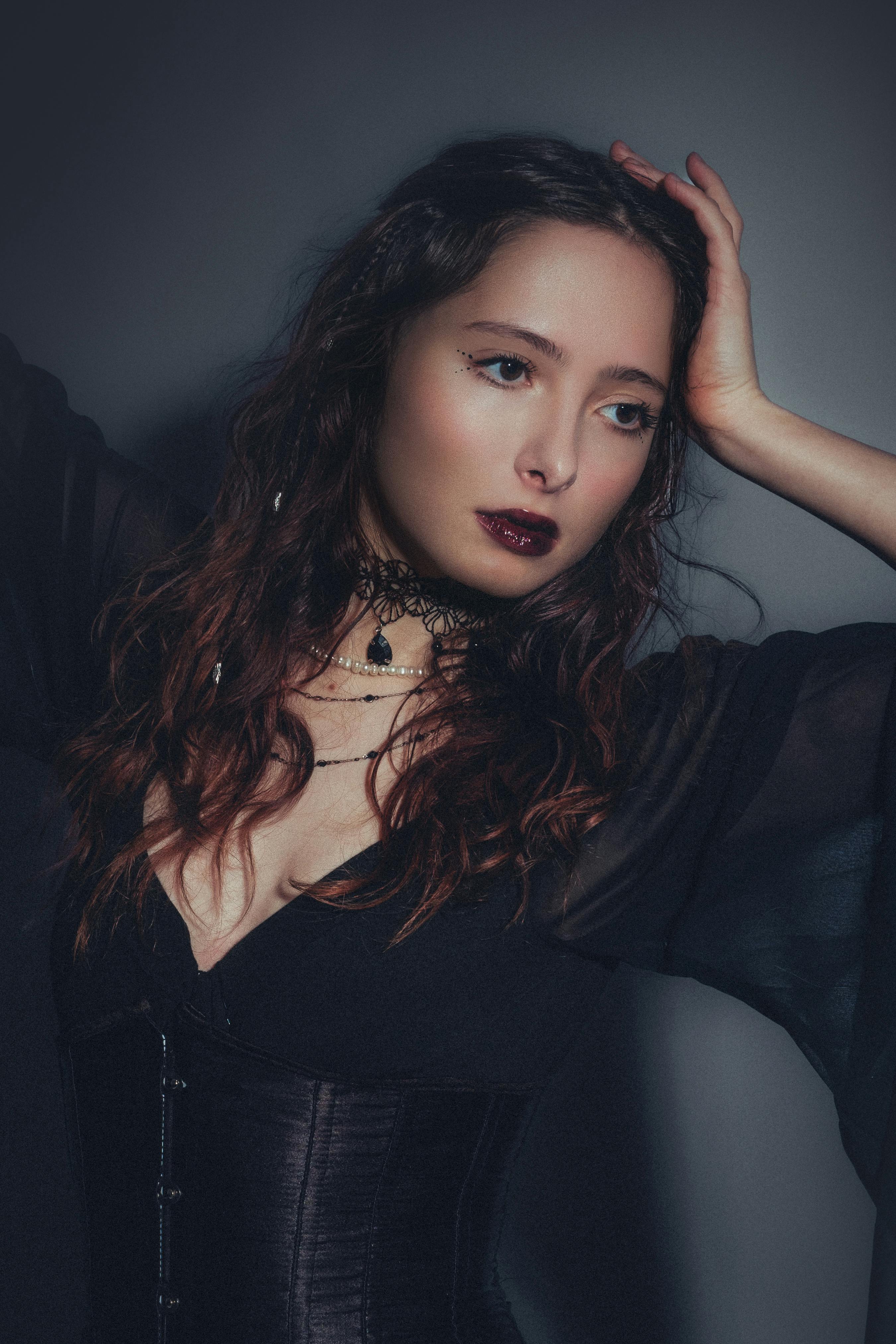 Elegant Woman in Dark Gothic Fashion Portrait · Free Stock Photo