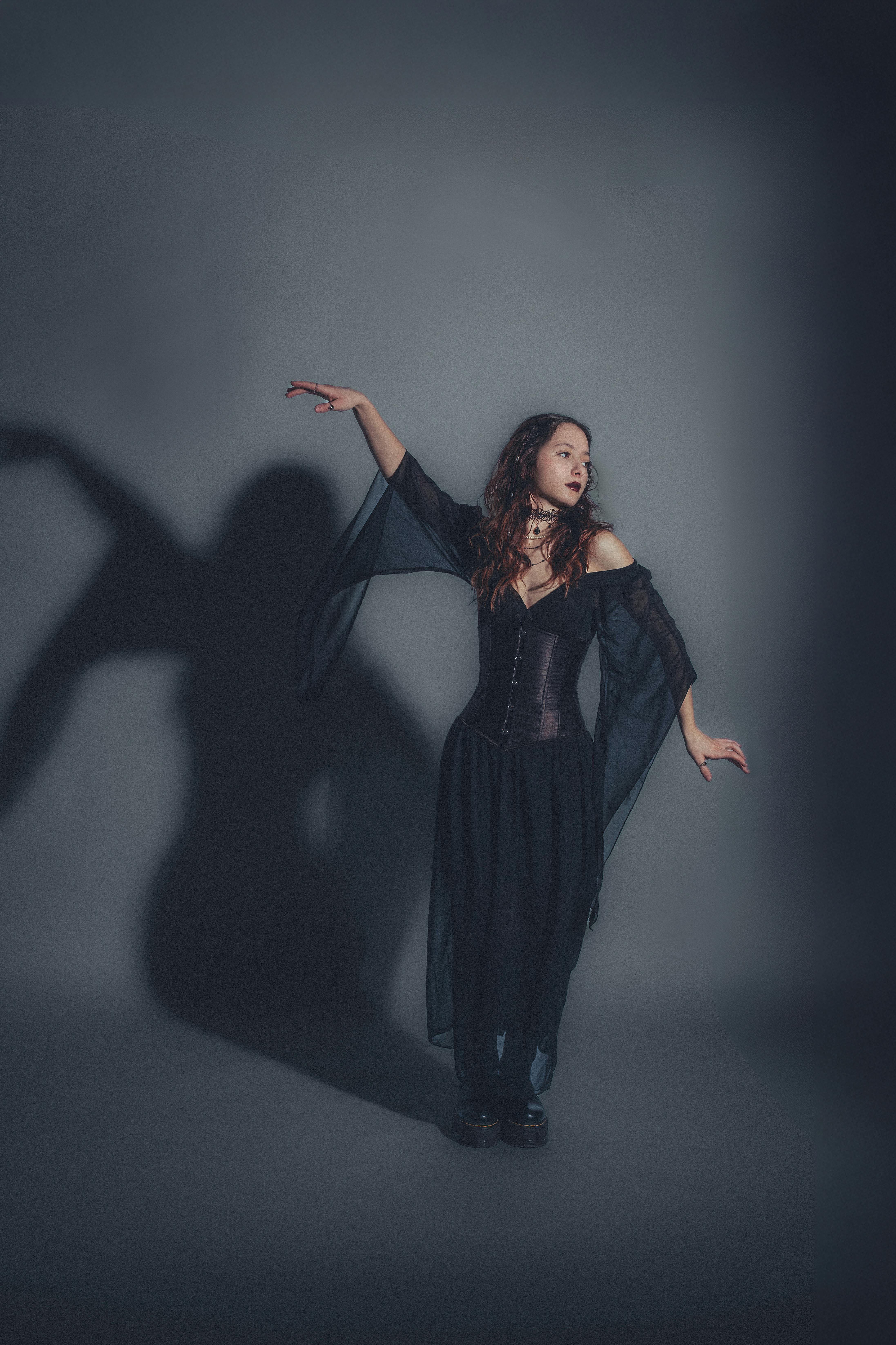 Elegant Gothic Dance Portrait in Studio Lighting · Free Stock Photo