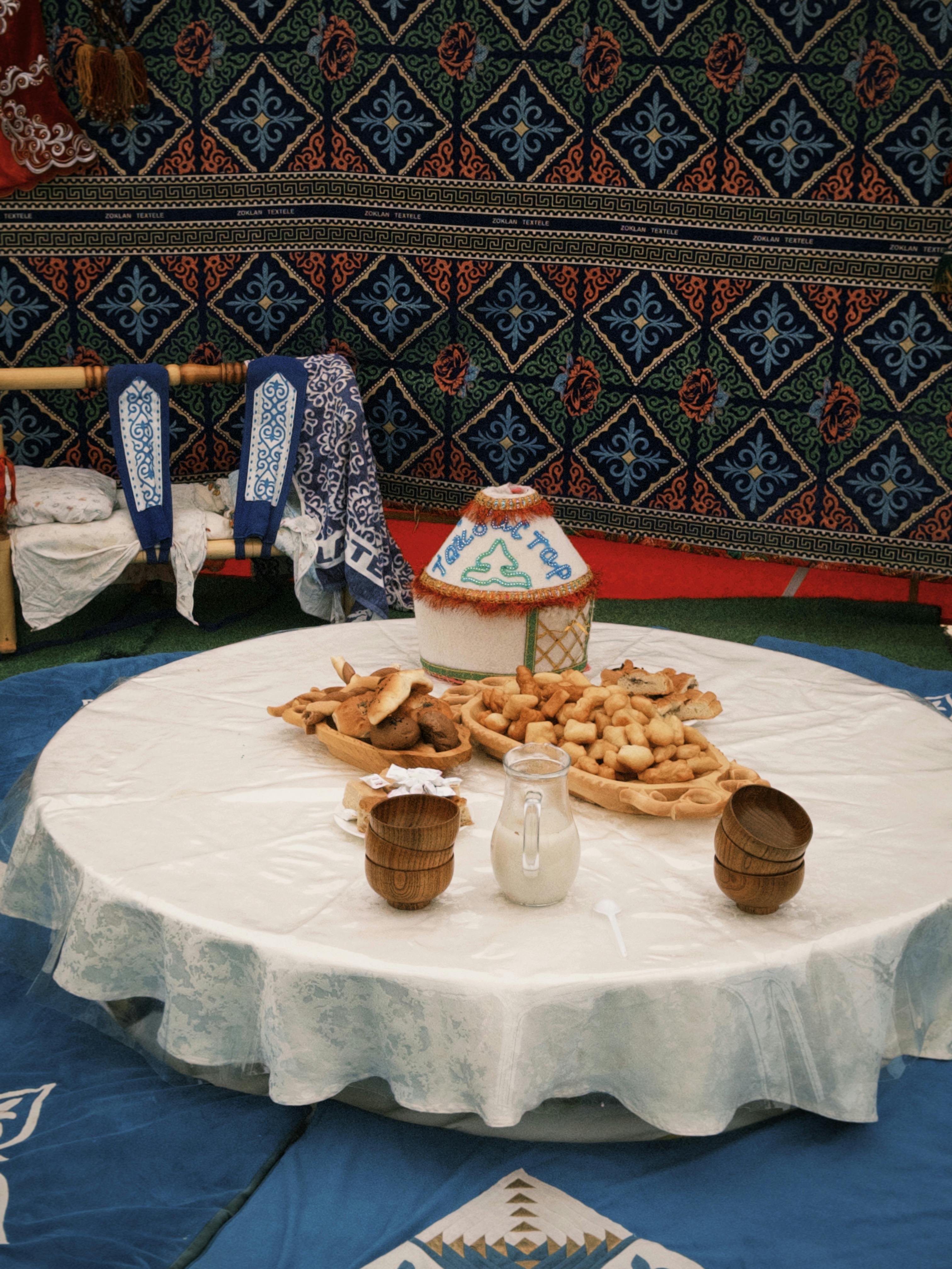 Traditional Central Asian Feast Setup with Decor · Free Stock Photo