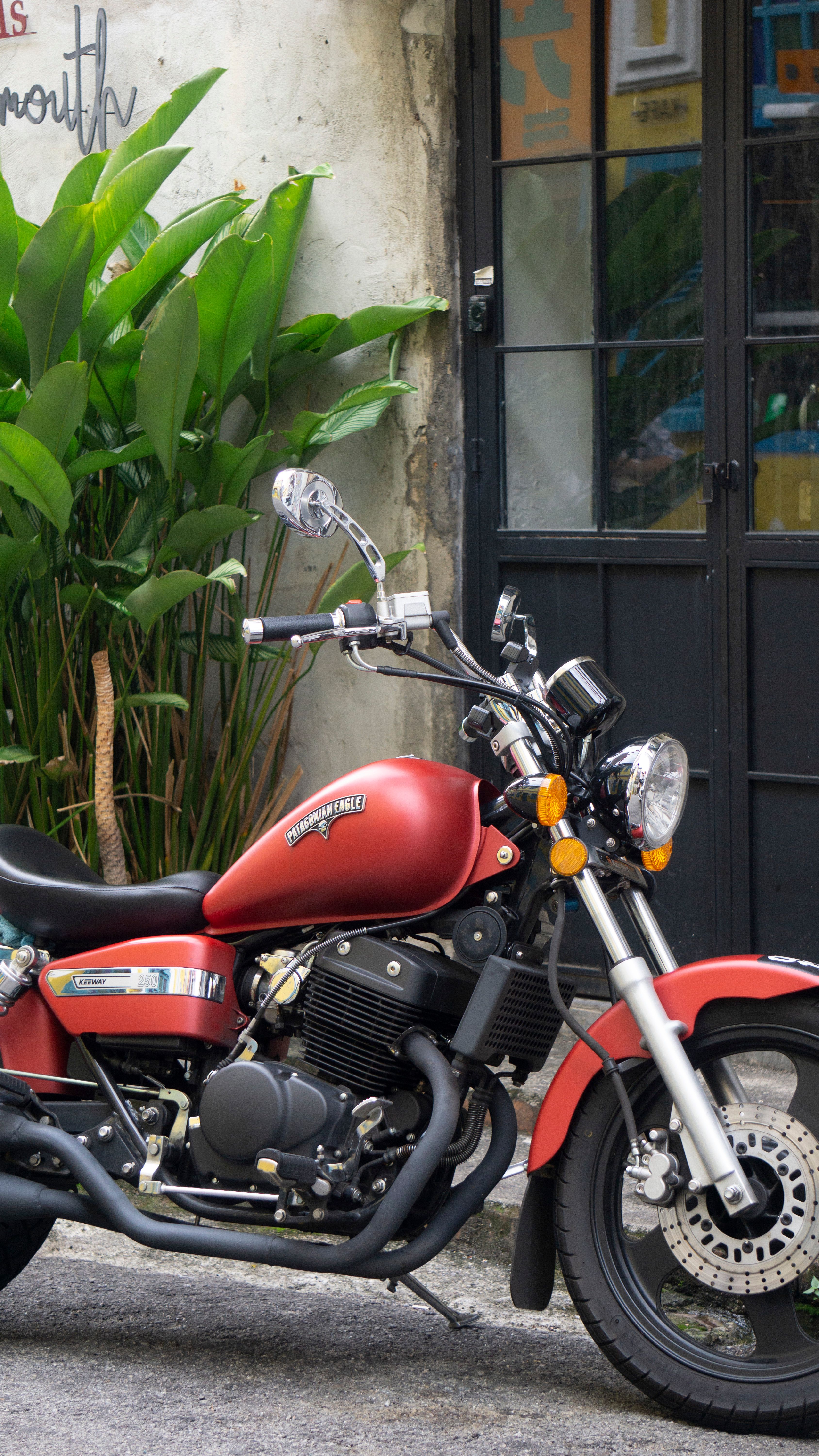 Red Harley-Davidson Motorcycle in Urban Setting · Free Stock Photo
