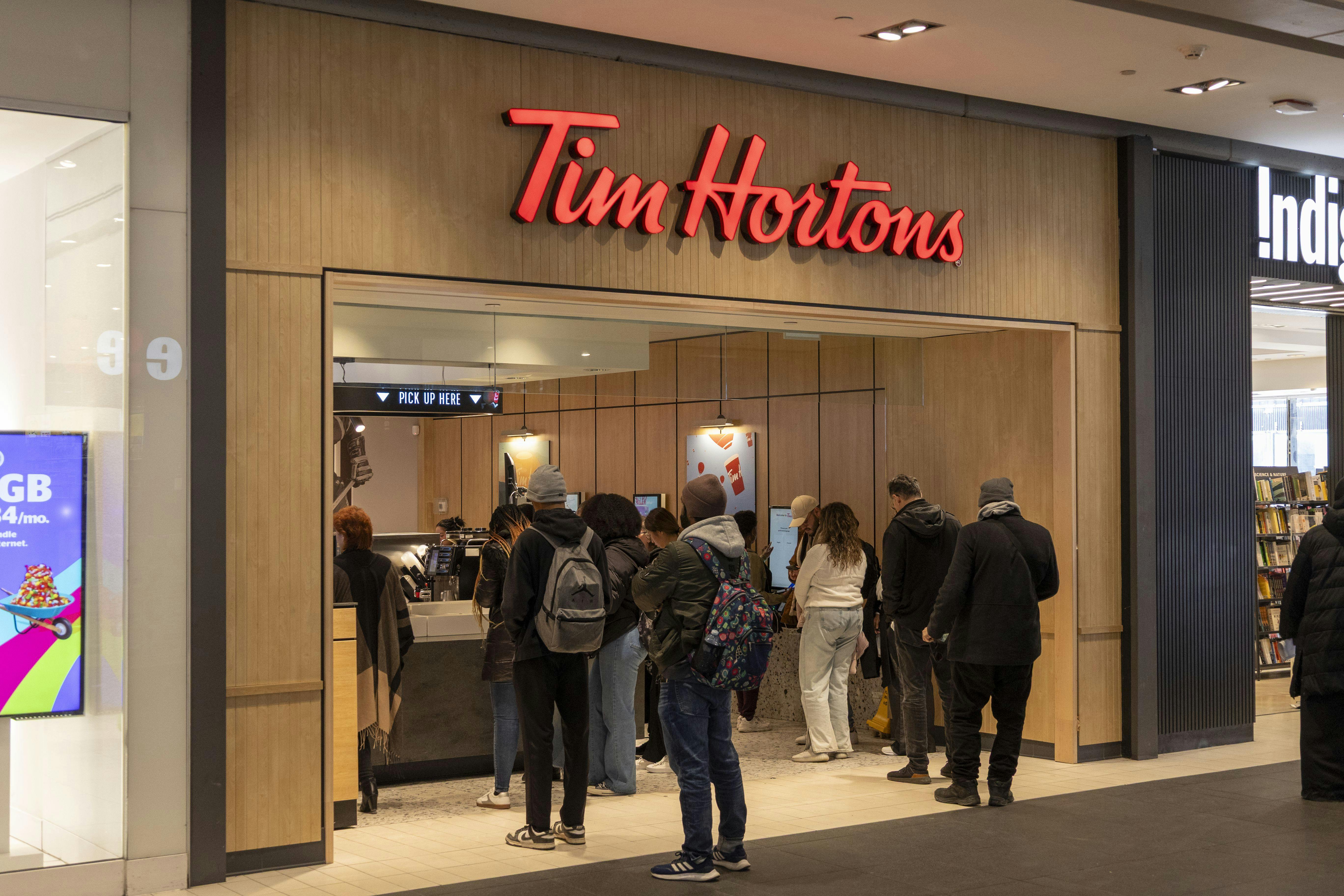 Tim Hortons Storefront with Customers in Line · Free Stock Photo