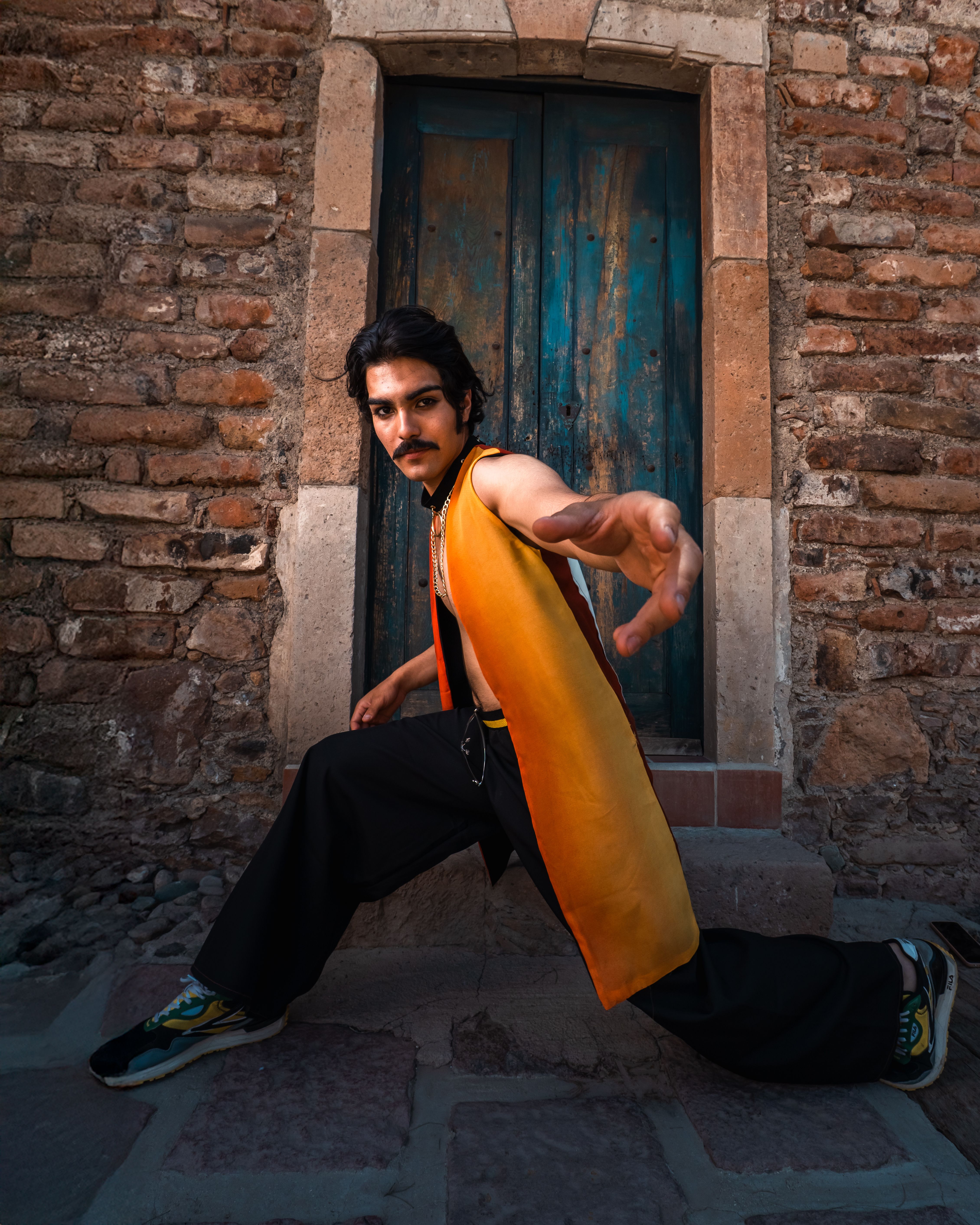 Dynamic Portrait of Man in Traditional Outfit · Free Stock Photo