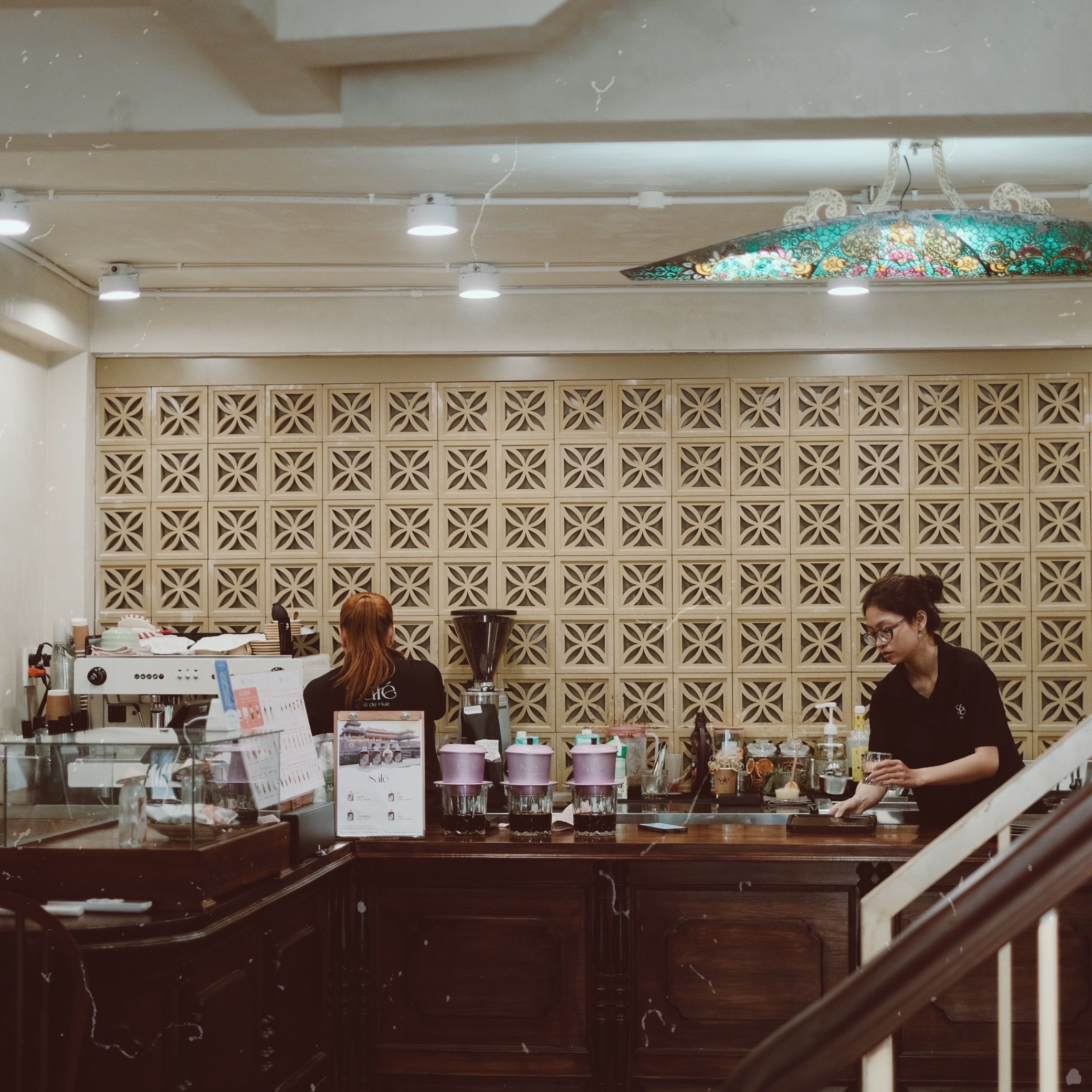 Cozy Indoor Coffee Shop with Baristas Preparing Beverages · Free Stock ...