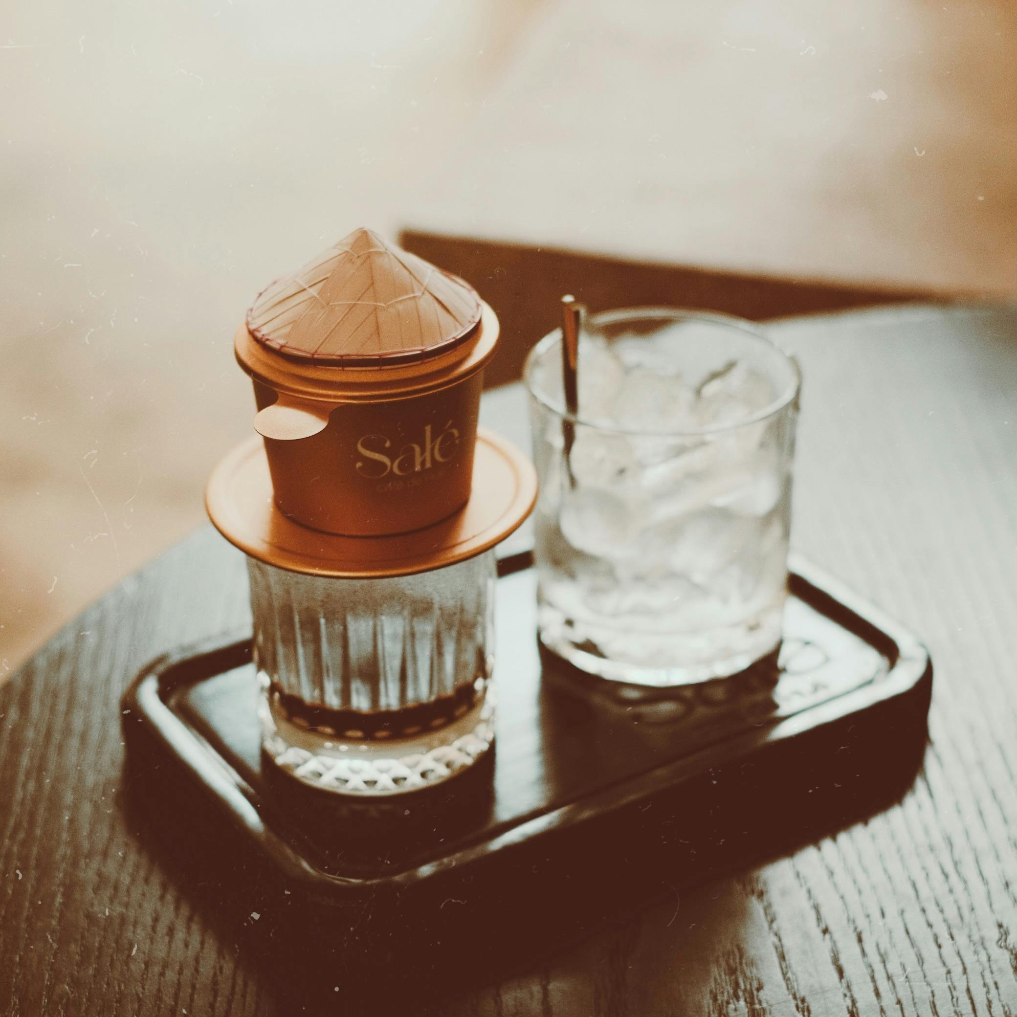 Vintage Coffee Drip Setup with Glass and Ice · Free Stock Photo
