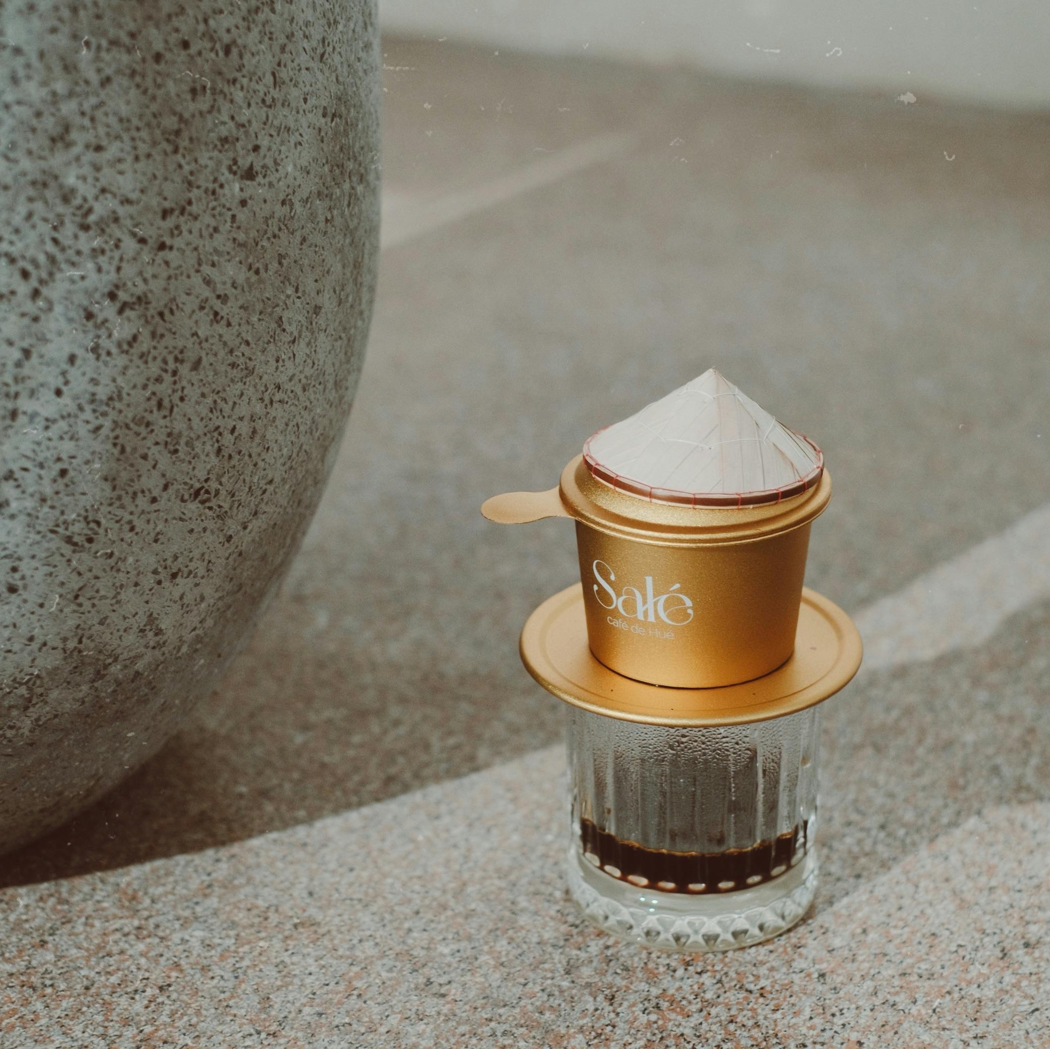 Elegant Coffee Dripper with Glass Cup on Stone · Free Stock Photo