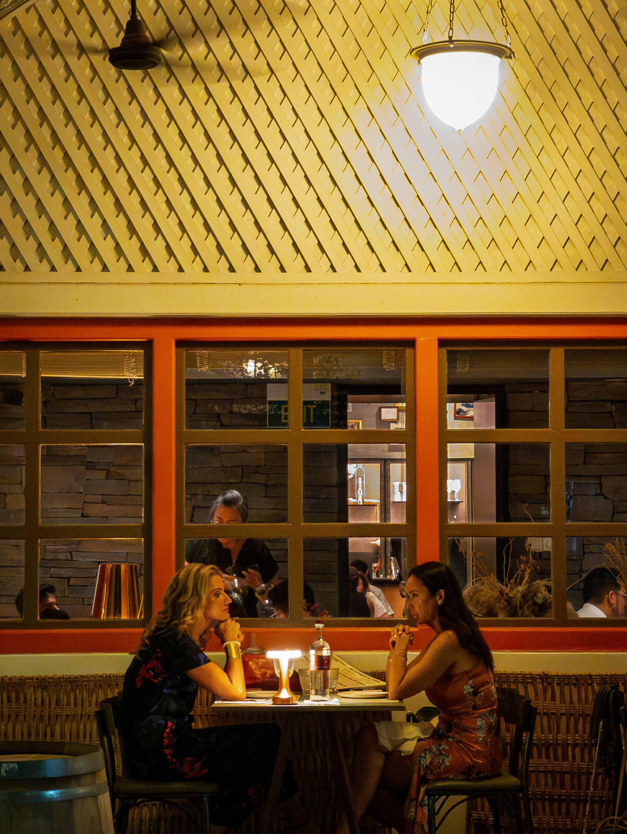 Evening Dining Scene at Cozy Restaurant · Free Stock Photo