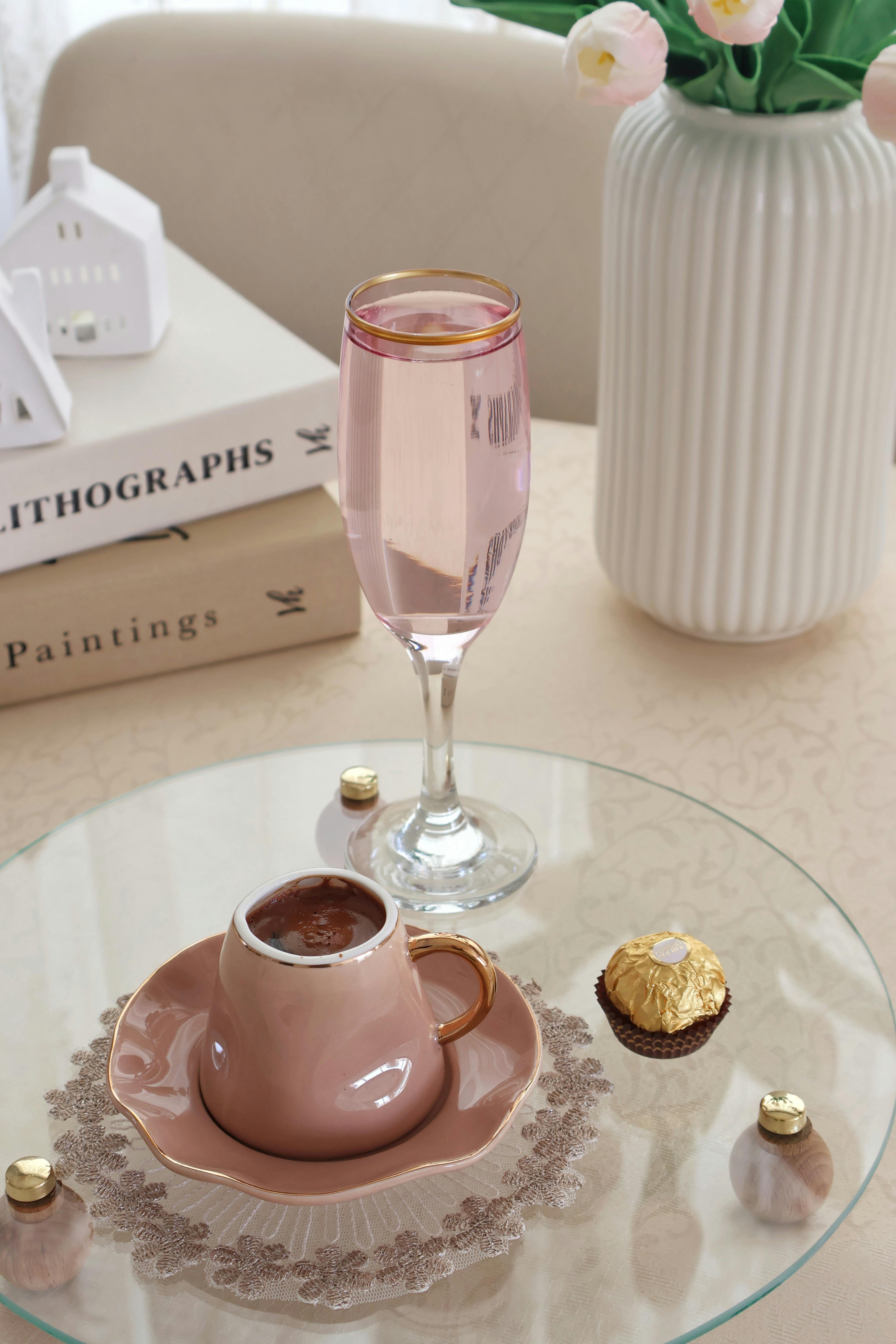 Elegant Coffee and Chocolate Setup on Glass Table · Free Stock Photo