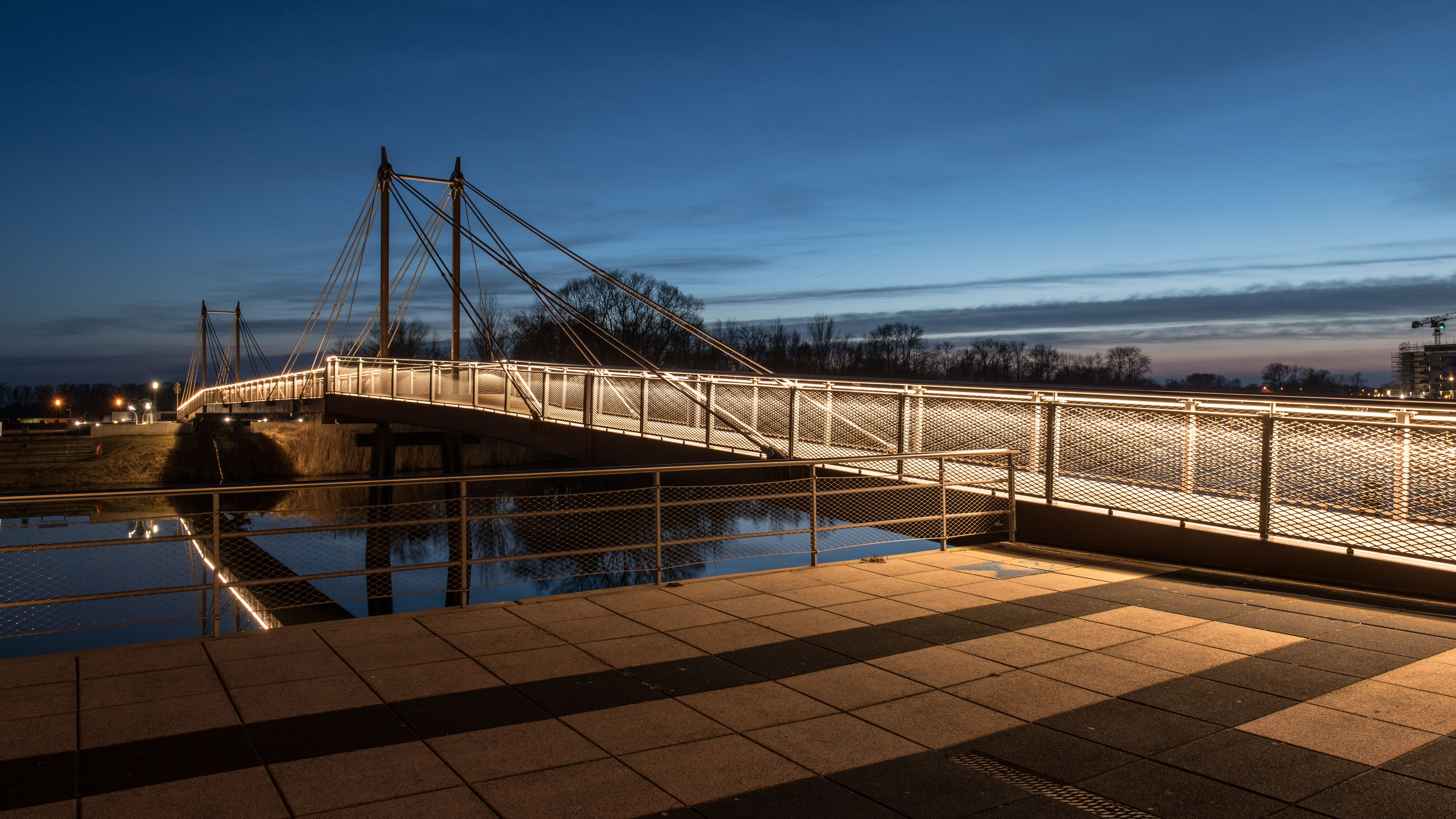 Illuminated Bridge at Dusk in Geesthacht · Free Stock Photo