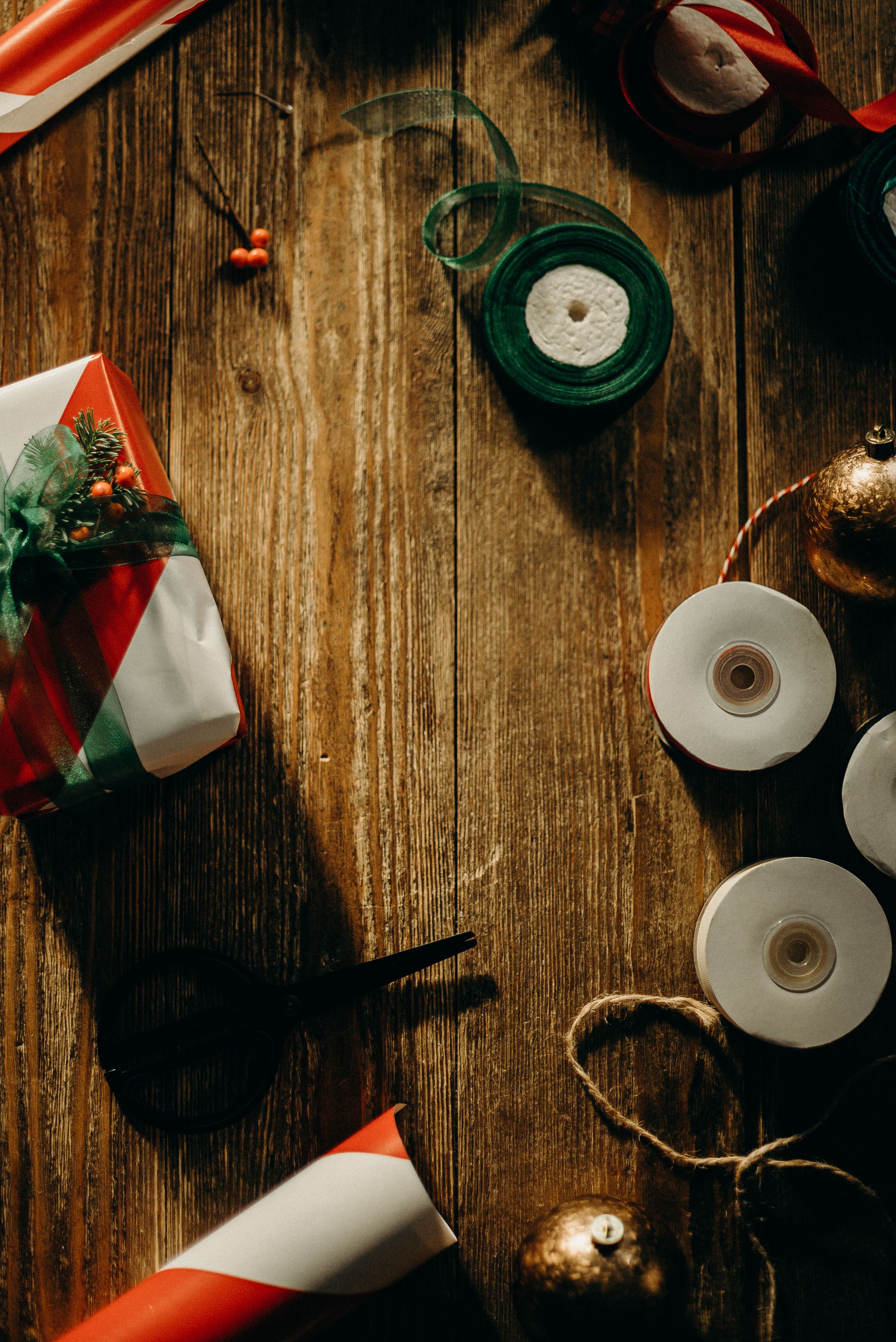 Photo of Two Brown Wrapped Gifts on Wooden Table · Free Stock Photo