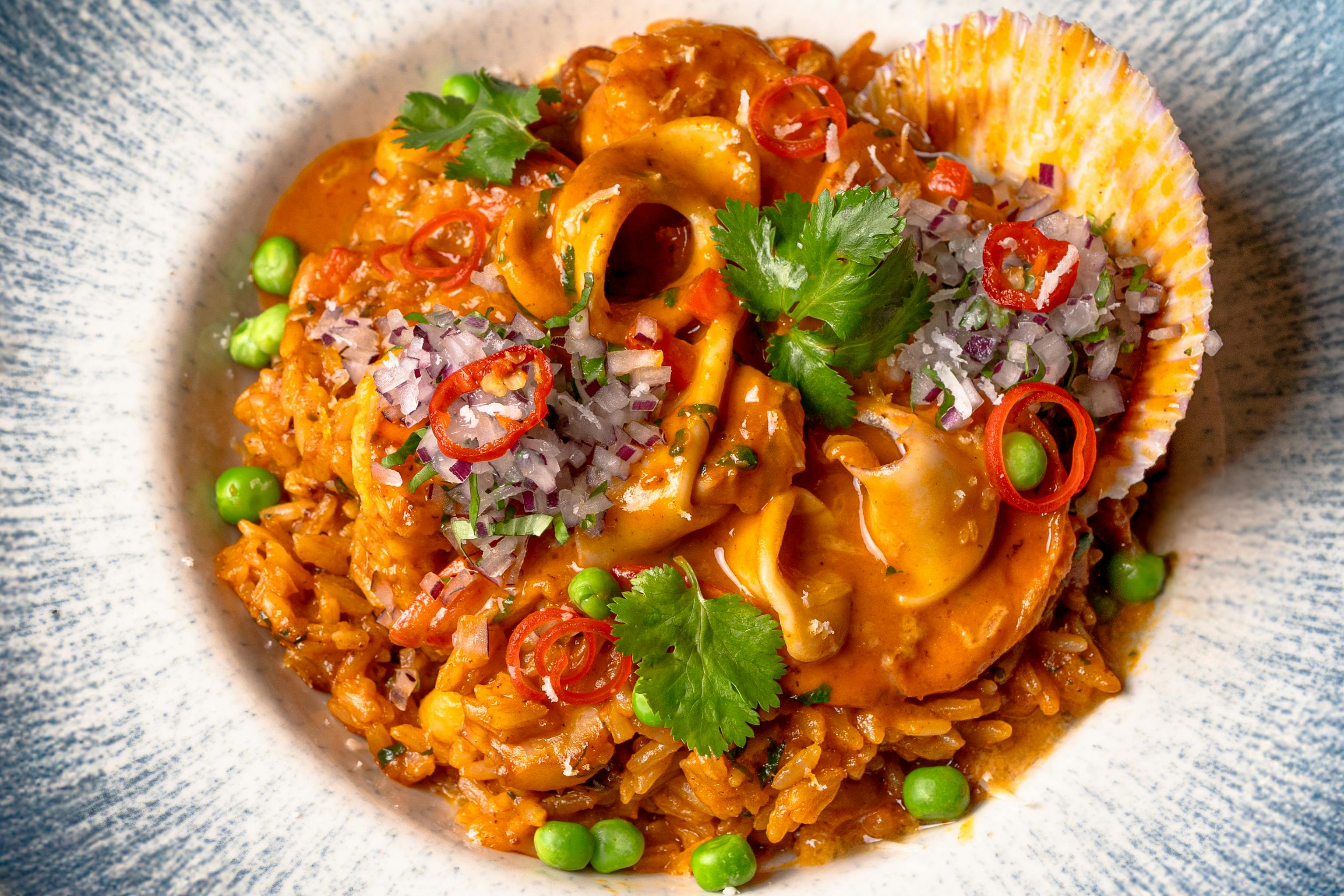 Delicious Seafood Risotto with Chili and Cilantro · Free Stock Photo