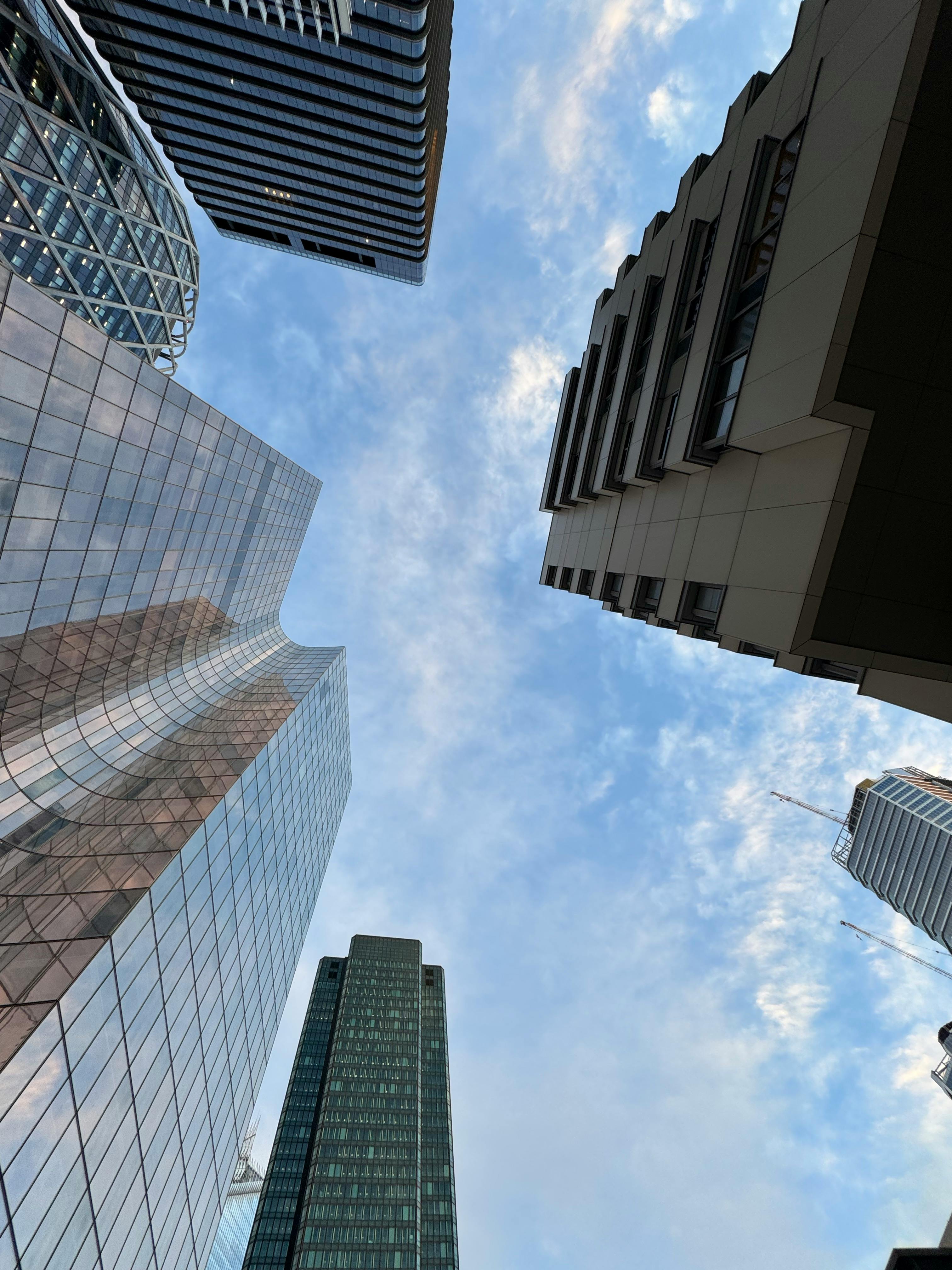 Skyscrapers and Blue Sky in Modern Cityscape · Free Stock Photo