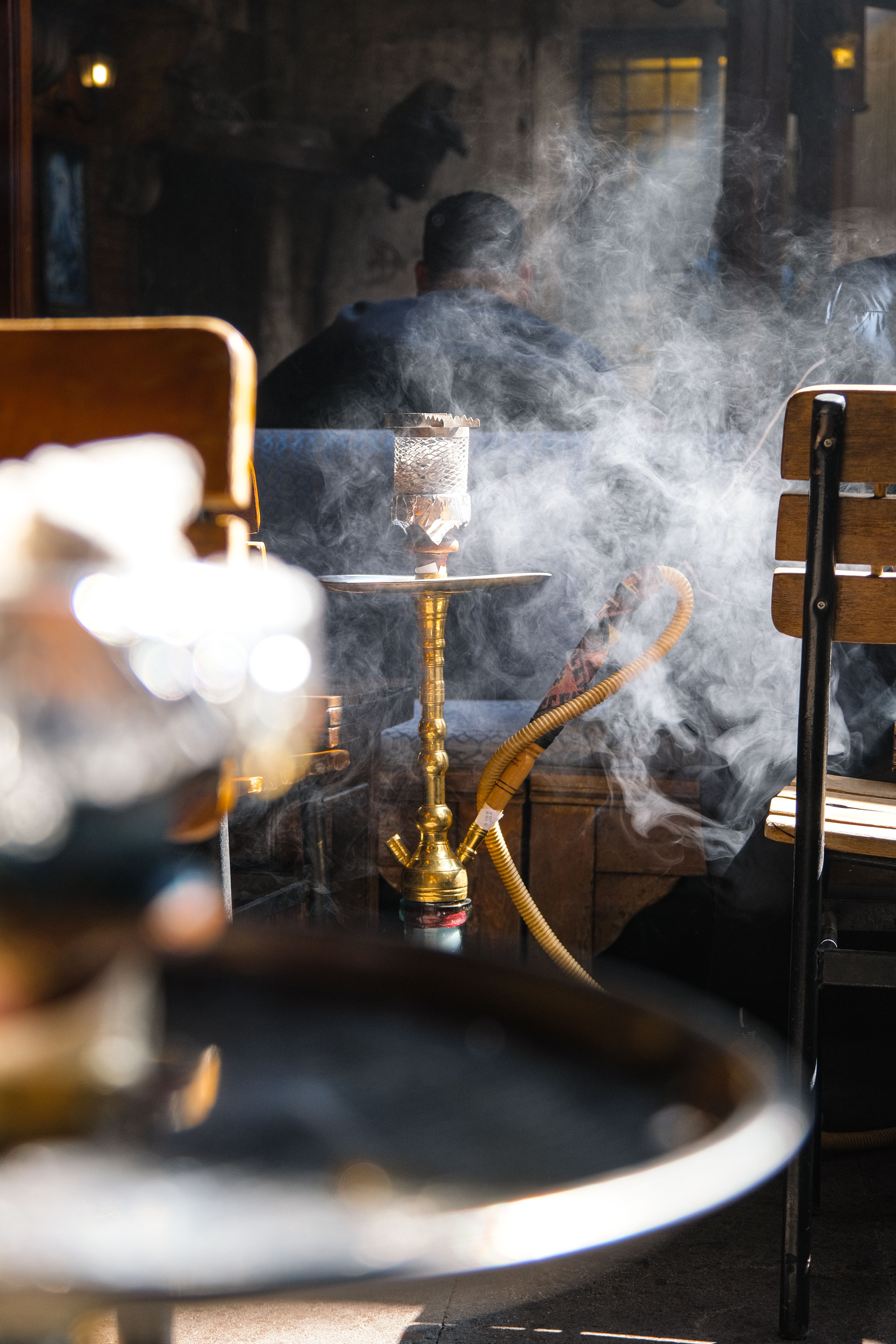 Atmospheric Hookah Lounge with Smoky Ambiance · Free Stock Photo