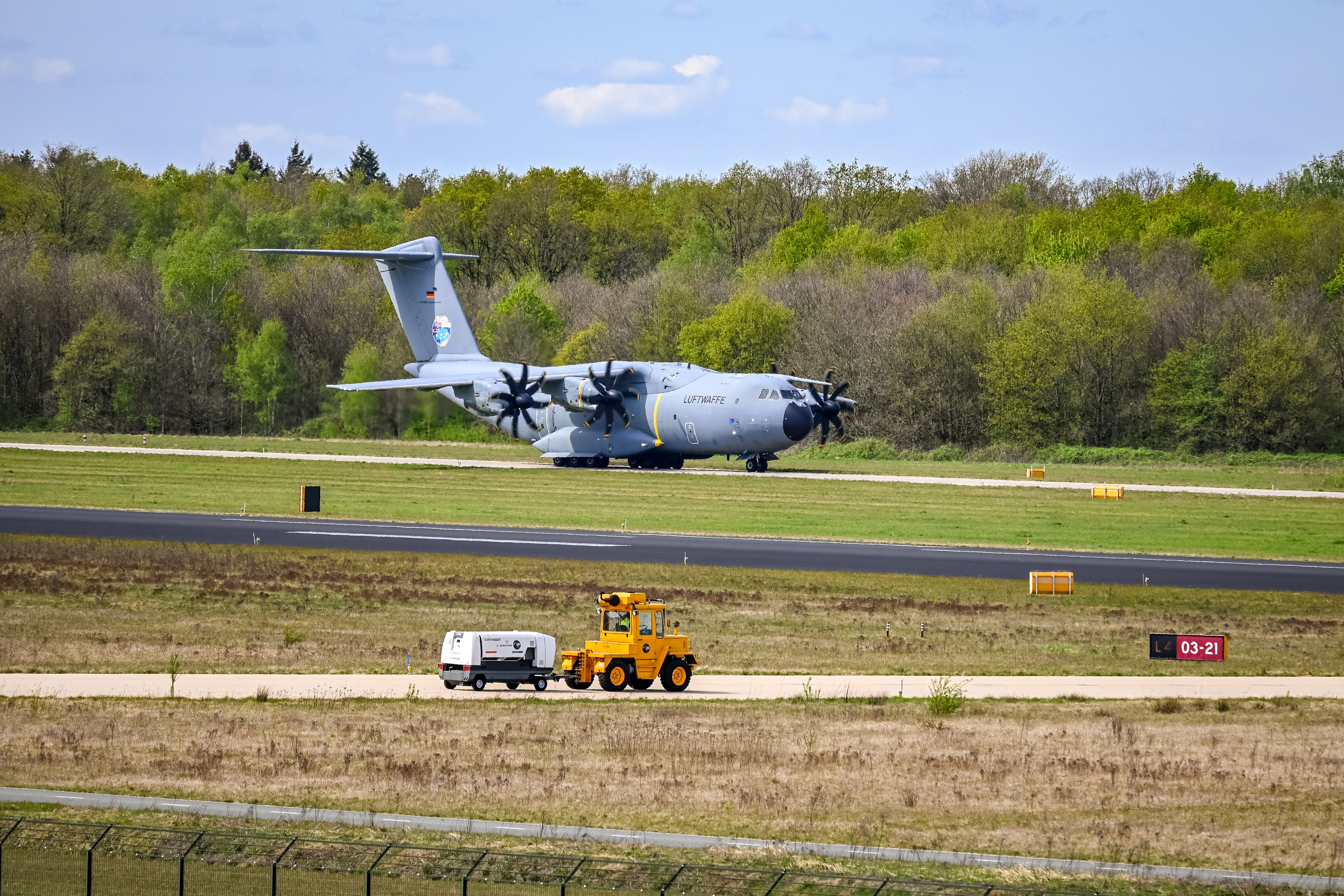 Cargo Plane Taxiing on Runway in Eindhoven · Free Stock Photo