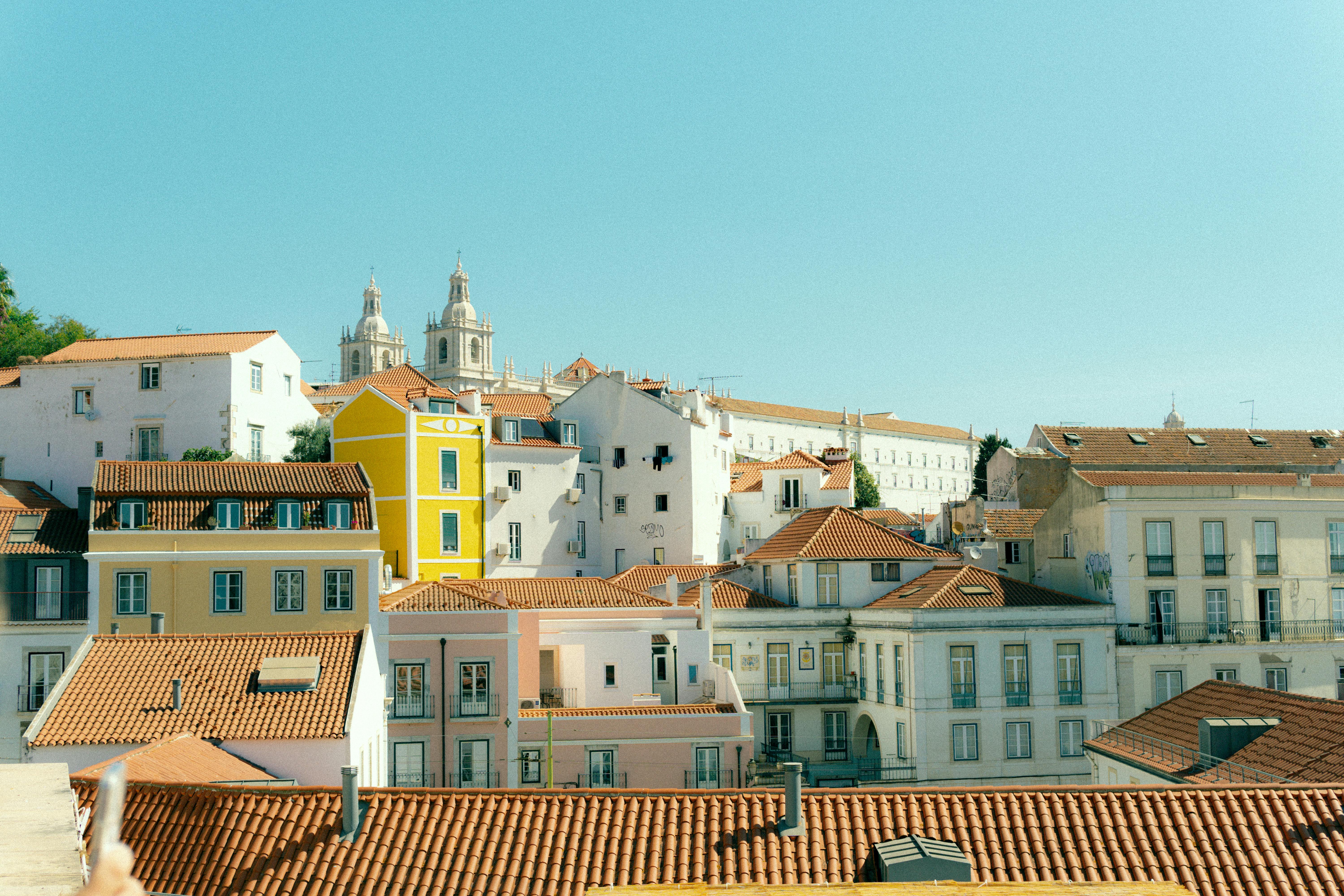Scenic Lisbon Rooftops Captured in Warm Sunlight · Free Stock Photo