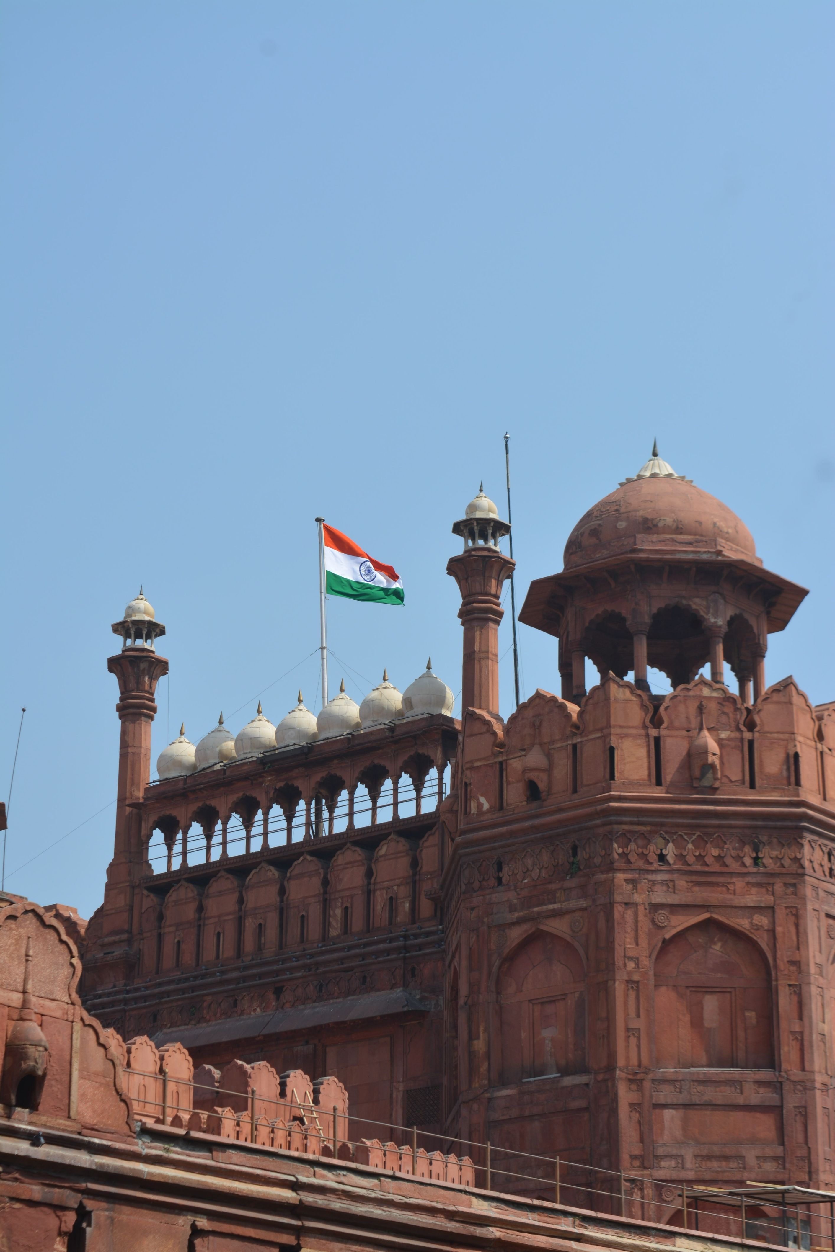 Majestic Red Fort with Indian Flag Fluttering High · Free Stock Photo