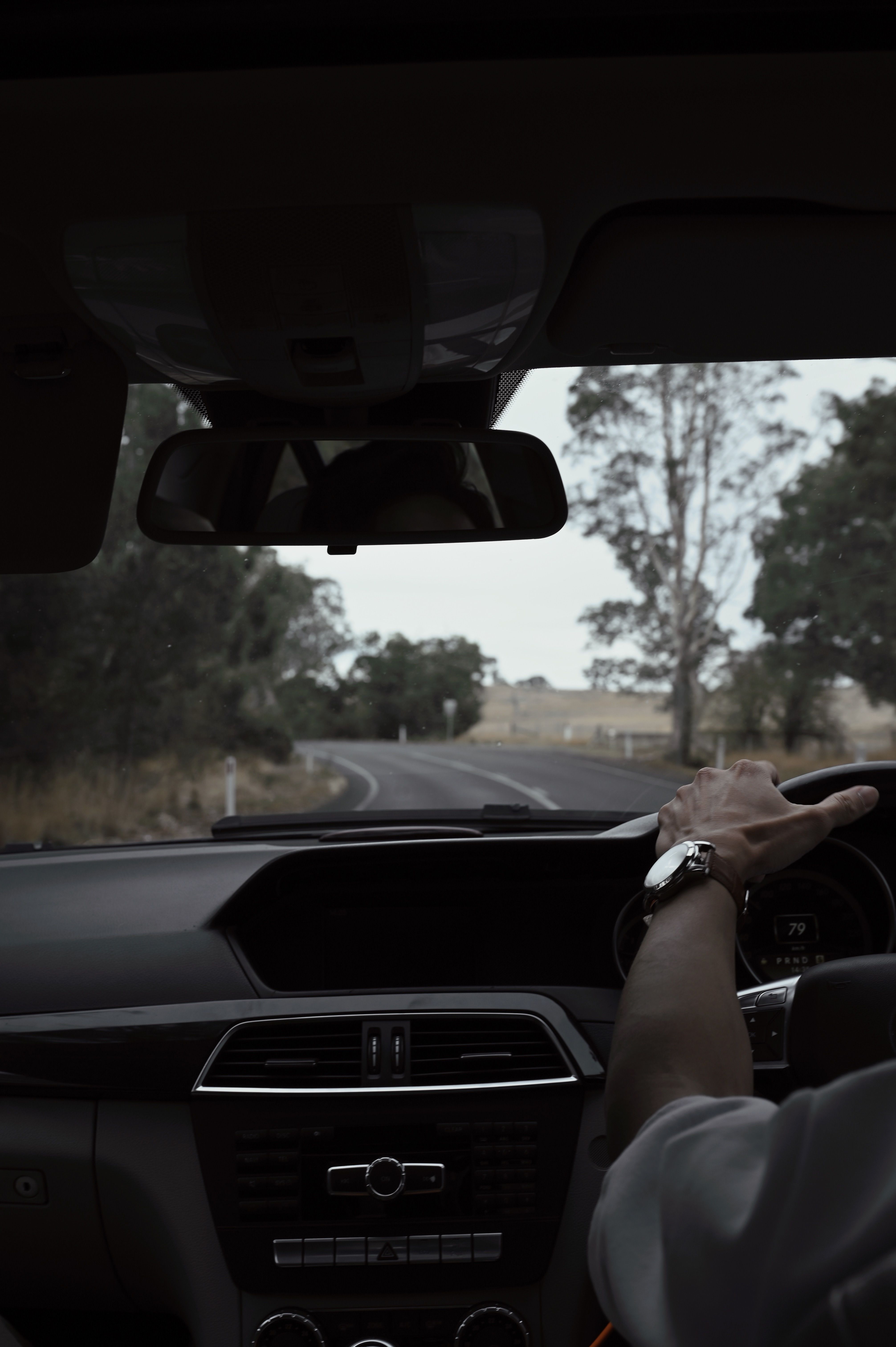 Driving Through a Scenic Countryside Road · Free Stock Photo
