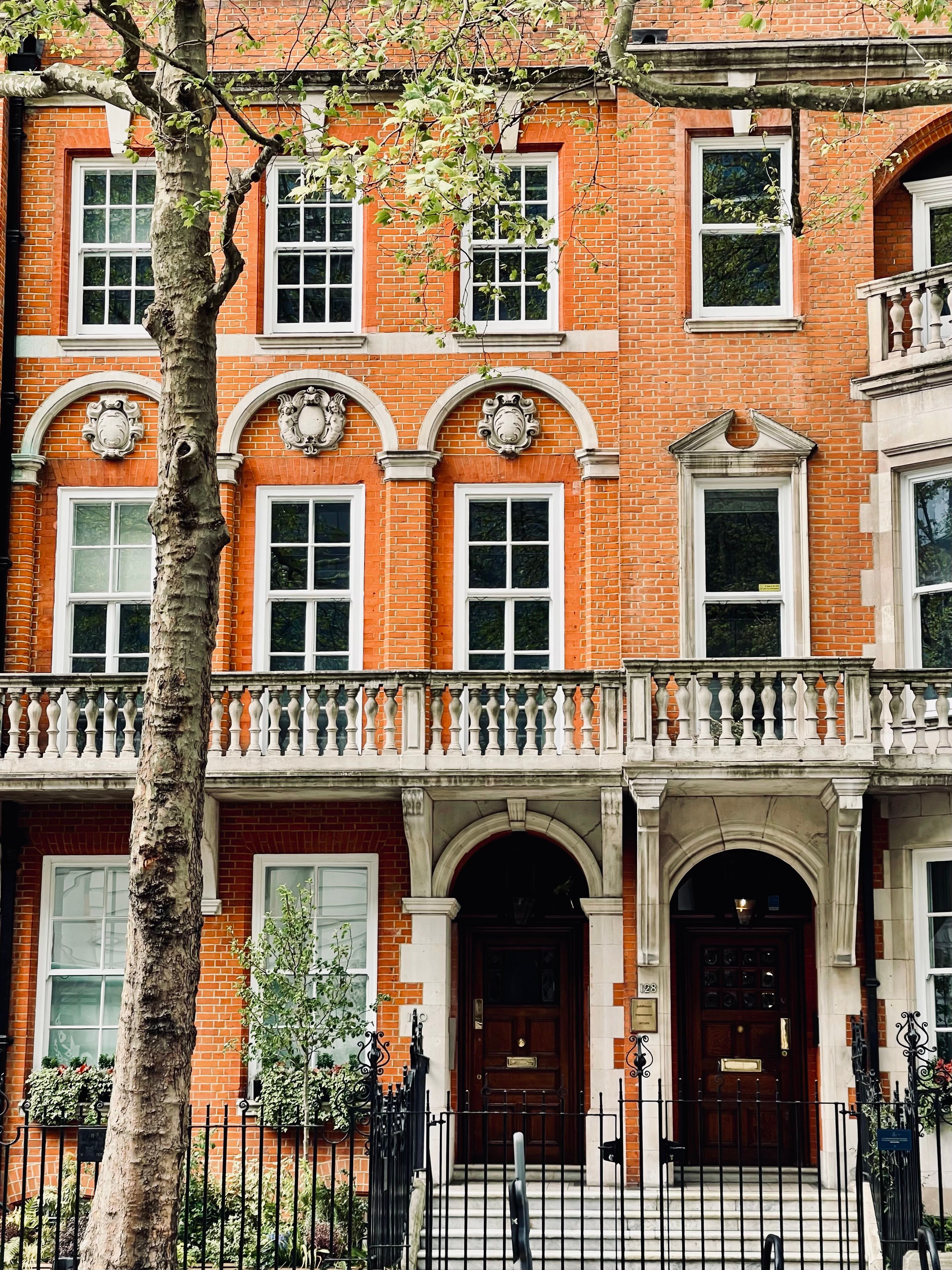 Historic Red Brick Building with Classic Architecture · Free Stock Photo