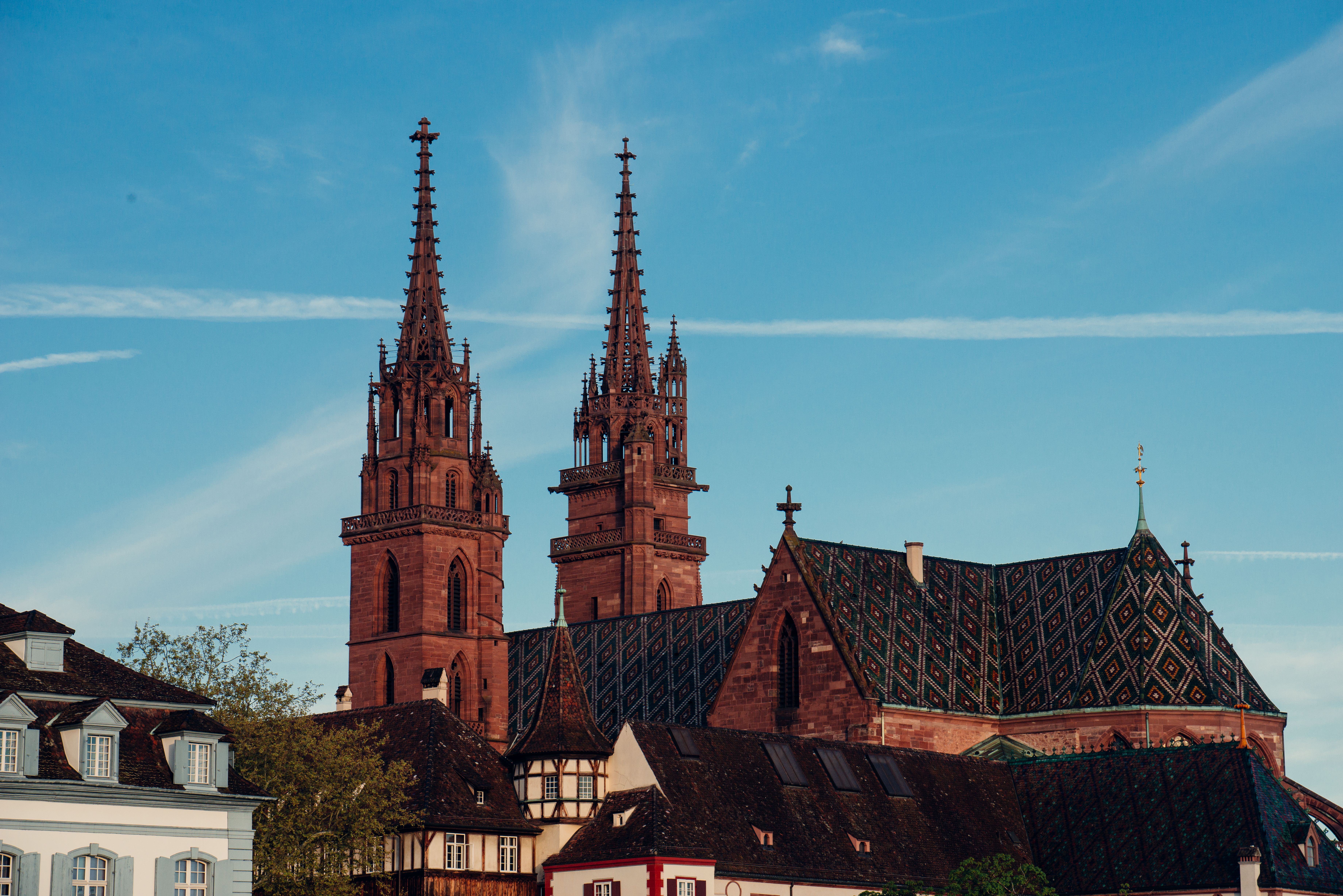 Majestic Basel Minster Cathedral Spires in Daylight · Free Stock Photo