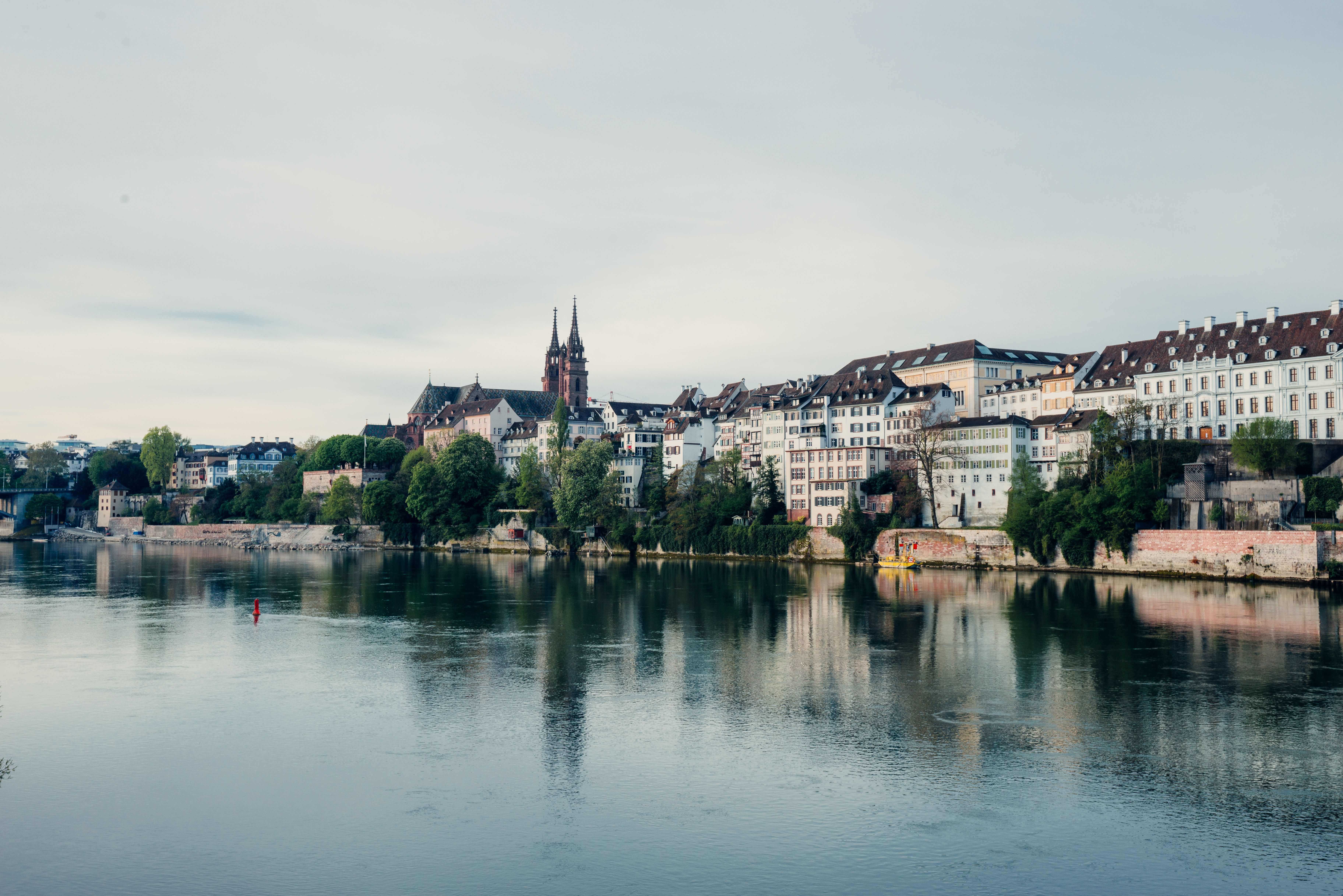 Scenic View of Basel's Historic Riverside Architecture · Free Stock Photo
