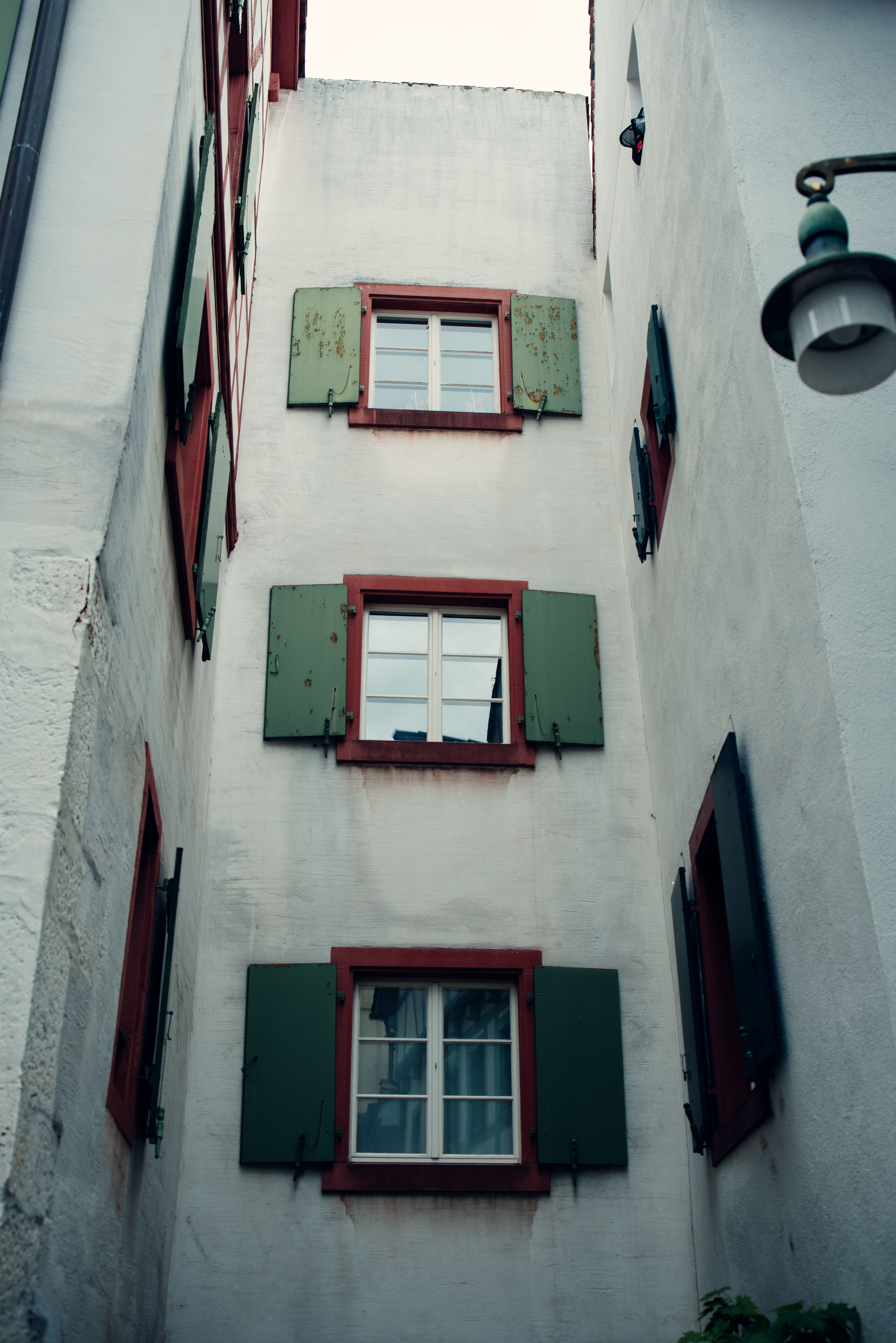 Historic Basel Architecture with Green Shutters · Free Stock Photo