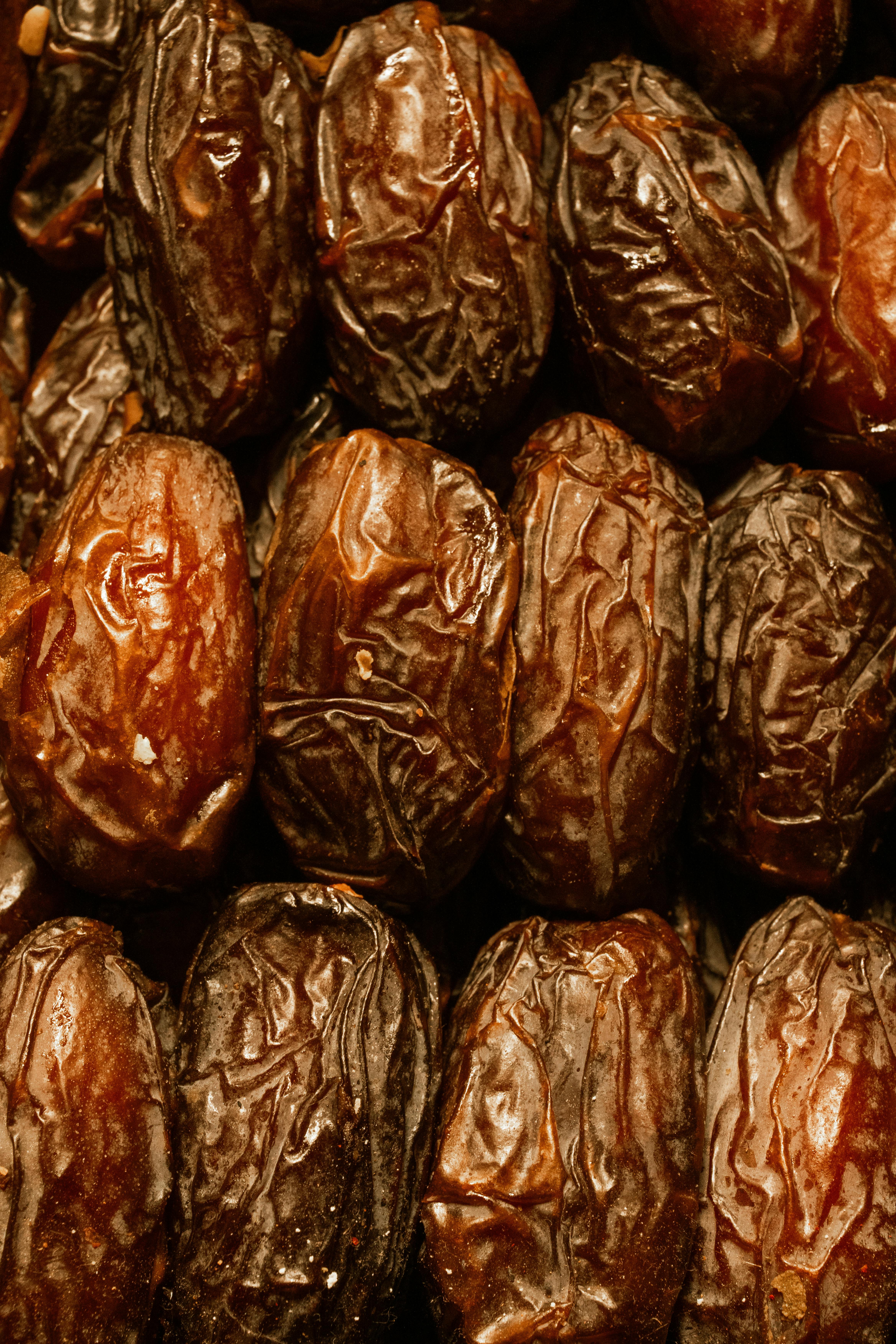 Close-Up of Fresh Brown Dates Cluster · Free Stock Photo
