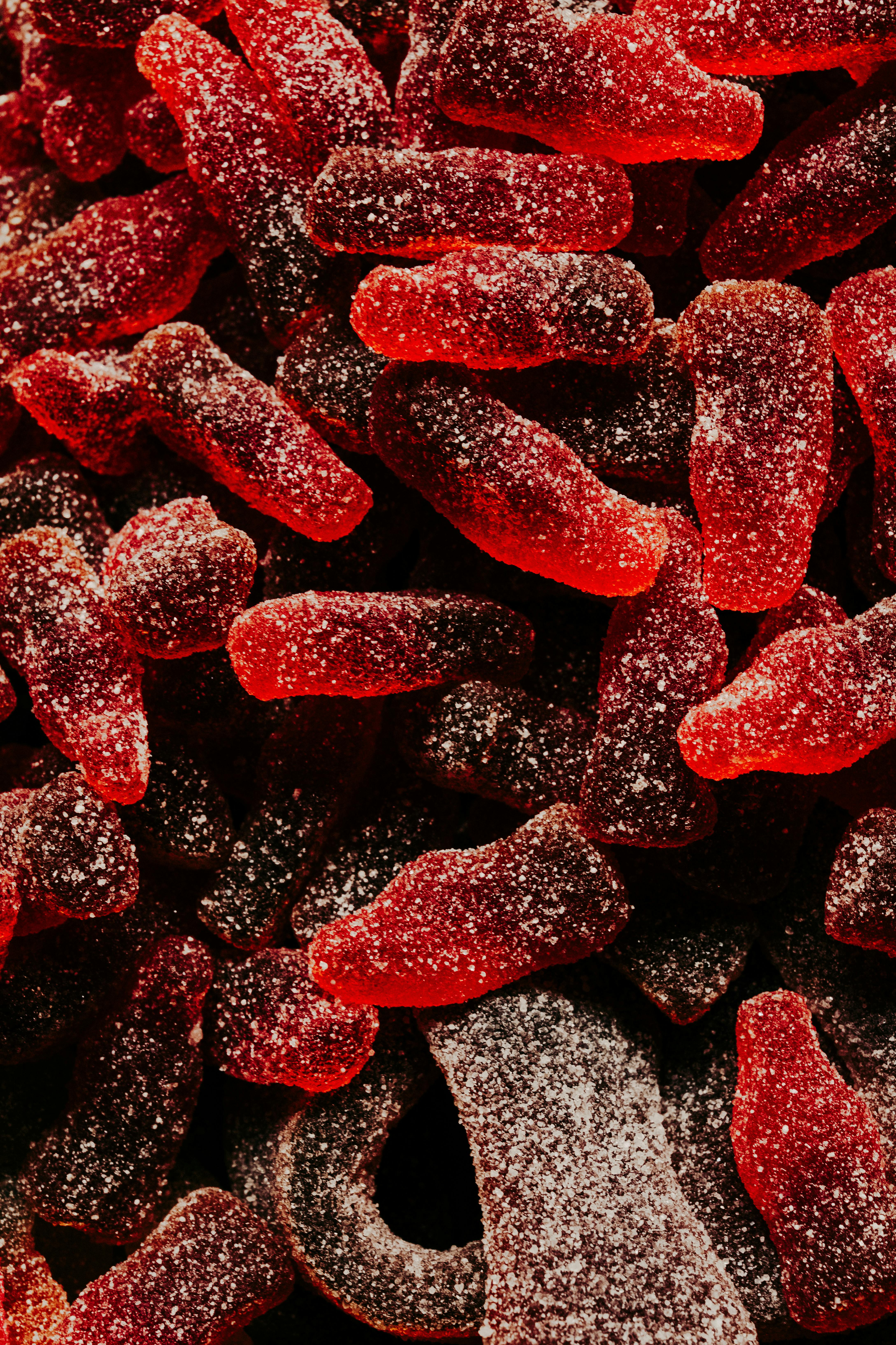 Primer Plano De Caramelos Rojos Azucarados Surtidos · Foto de stock ...