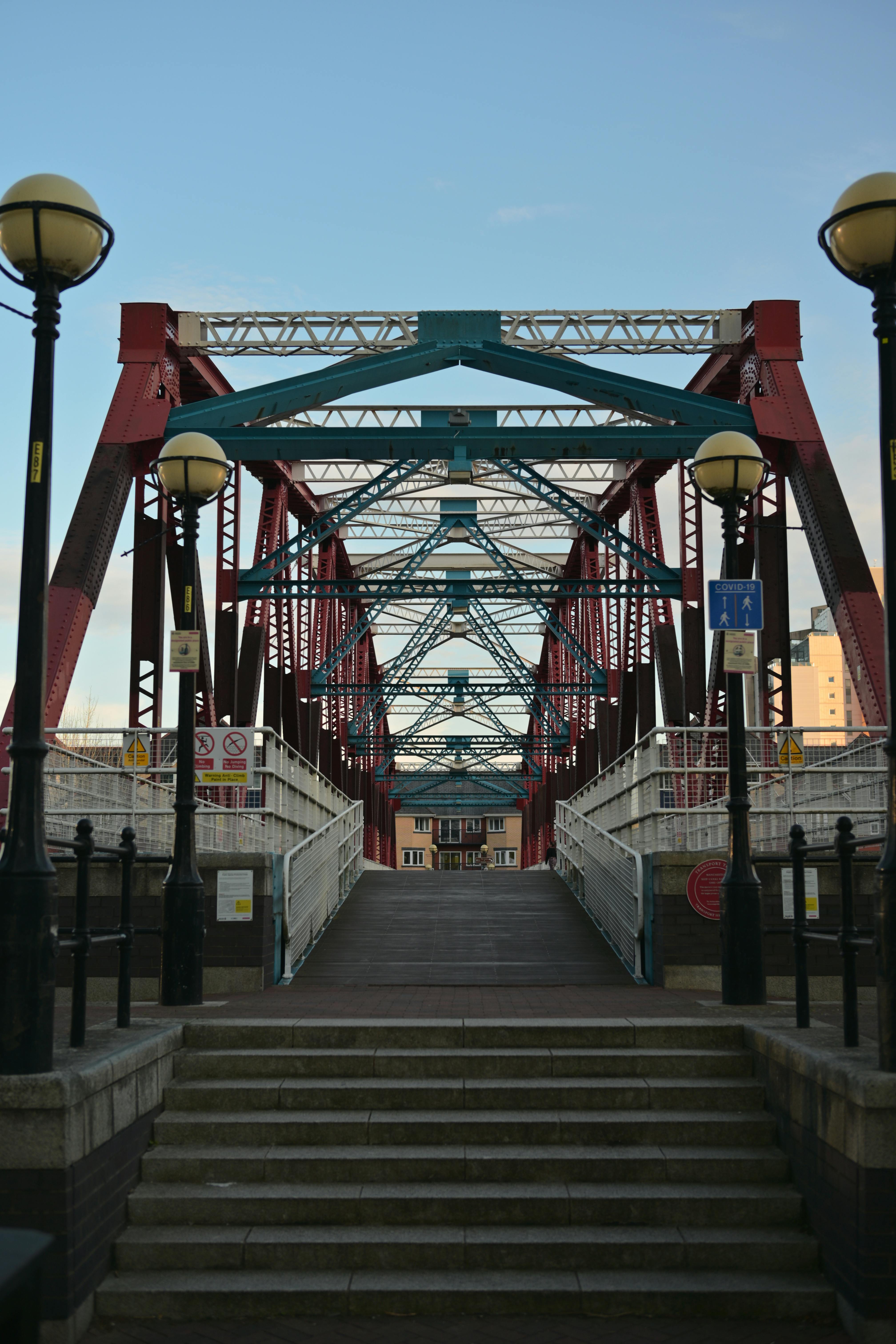 Symmetrical Iron Bridge with Staircase View · Free Stock Photo