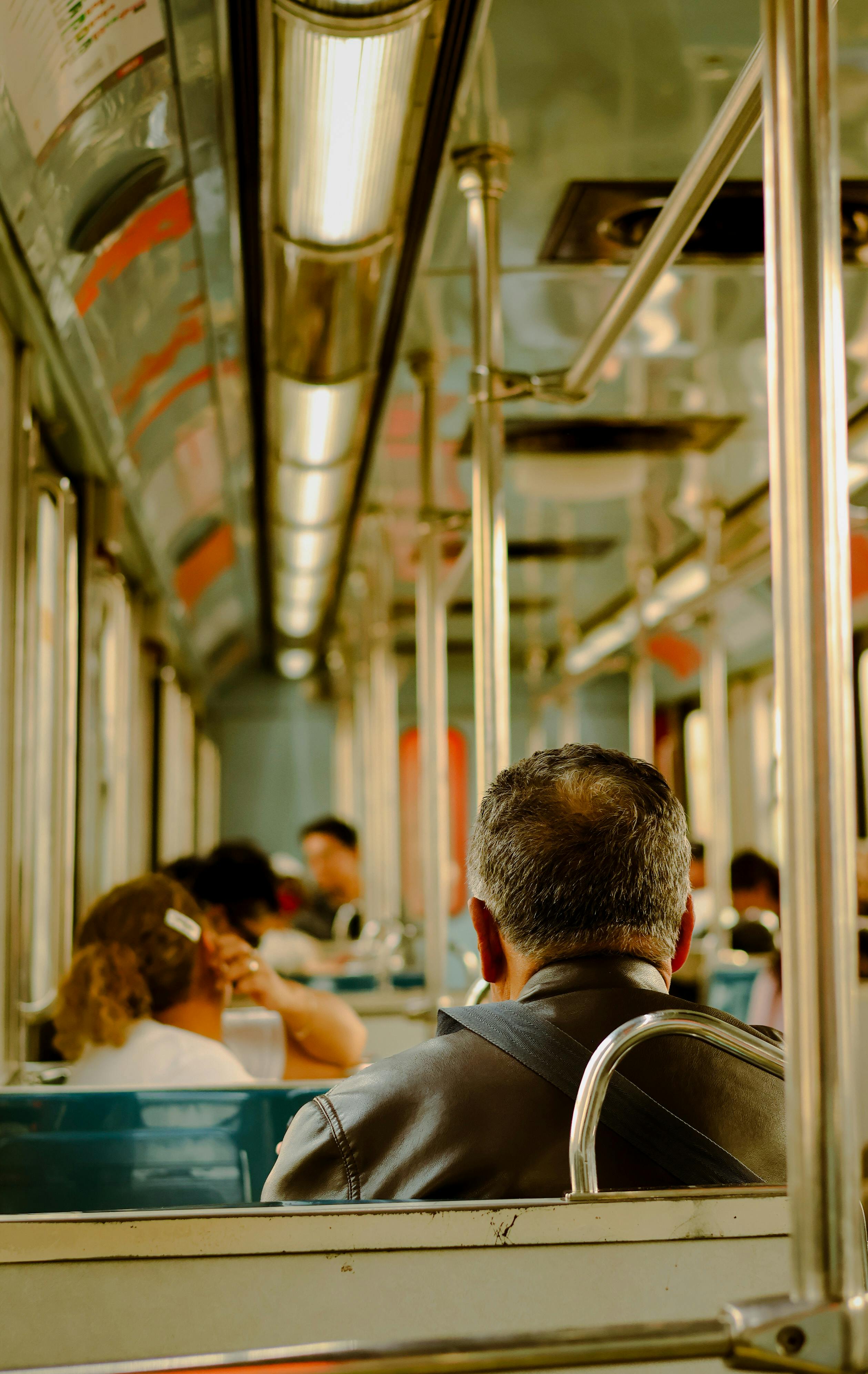 Commuters on a Busy Subway Train Ride · Free Stock Photo