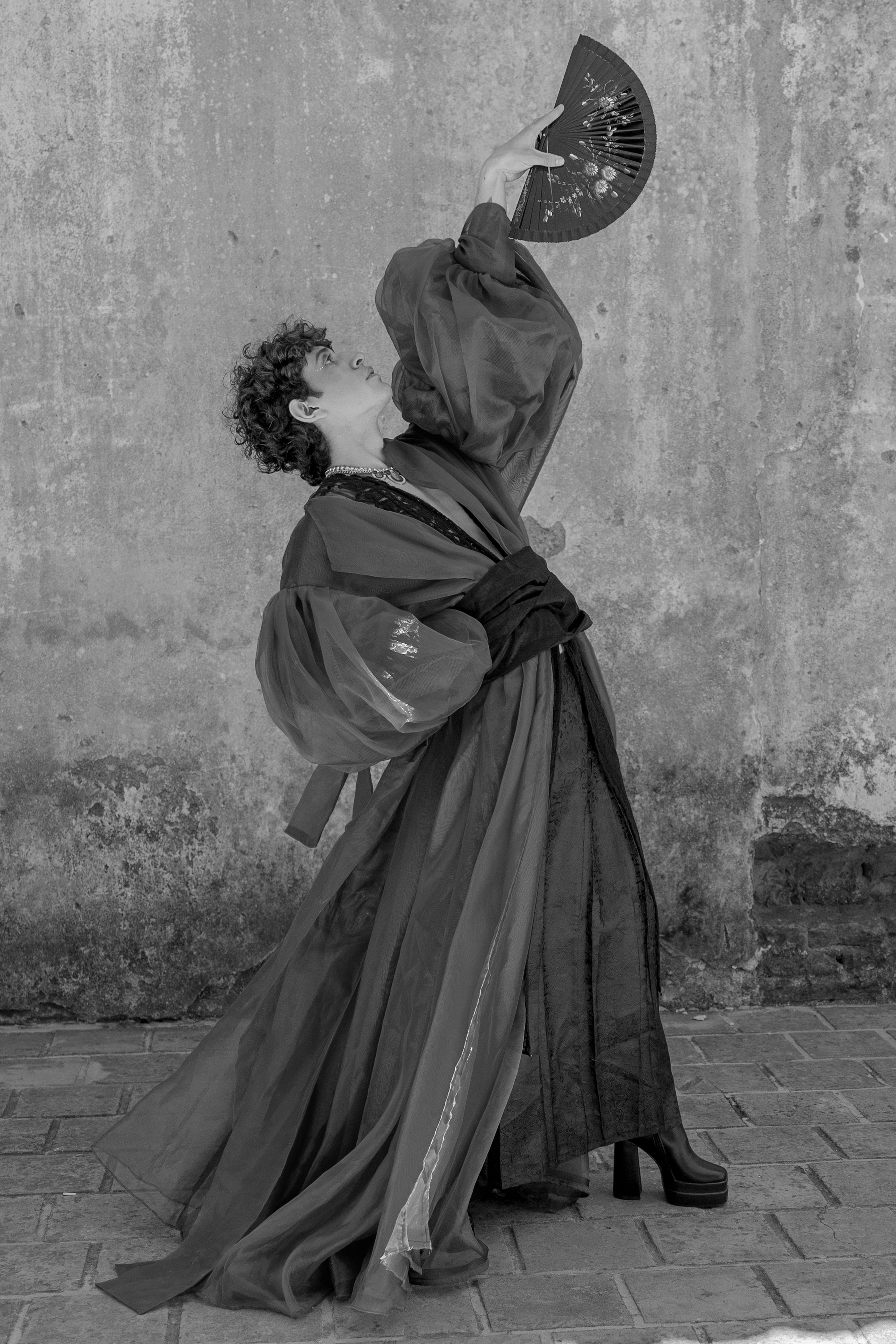 Elegant Dance Pose with Hand Fan in B&W · Free Stock Photo