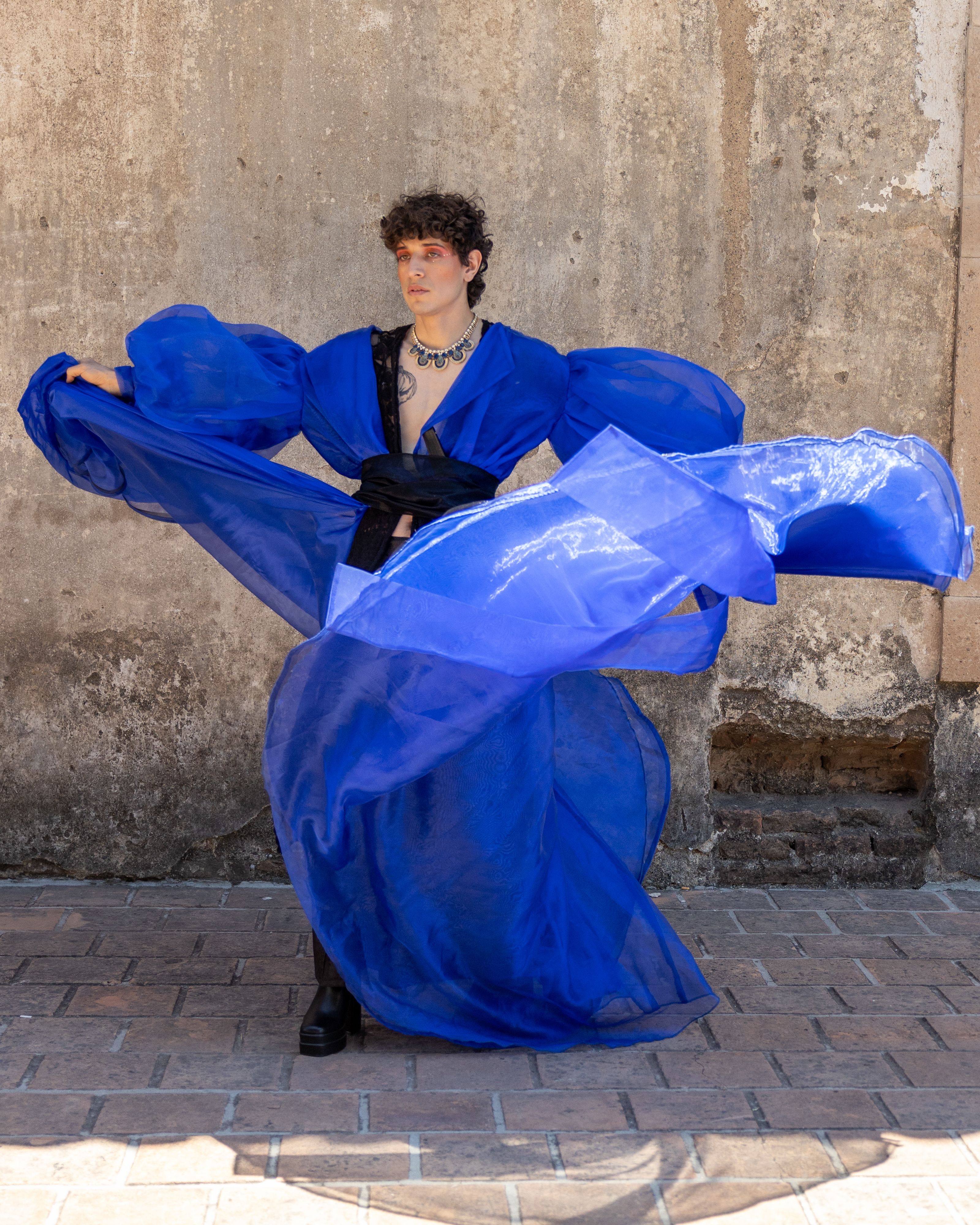 Creative Fashion Model Posing in Blue Gown Outdoors · Free Stock Photo