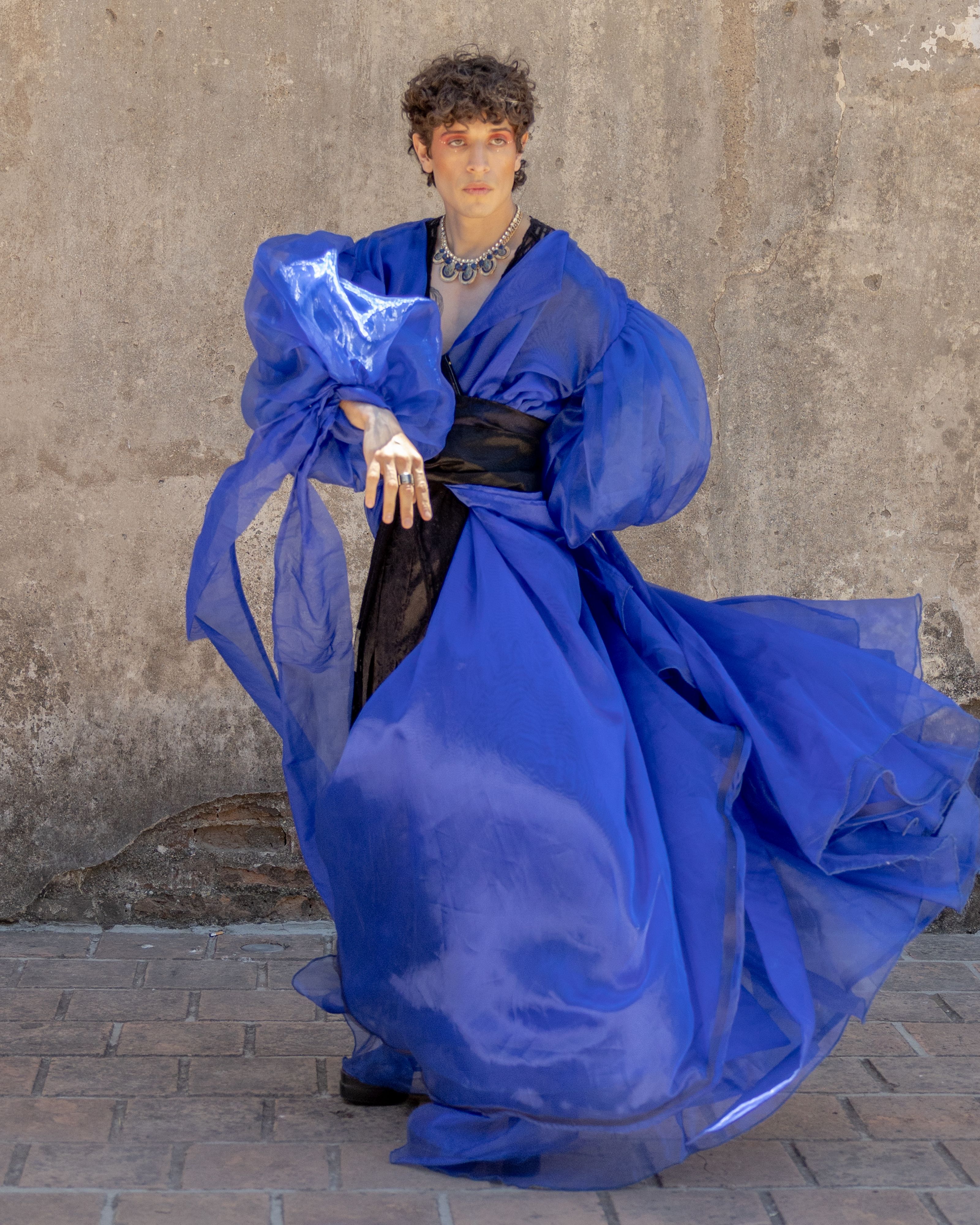 Elegant Portrait of Person in Flowing Blue Dress · Free Stock Photo