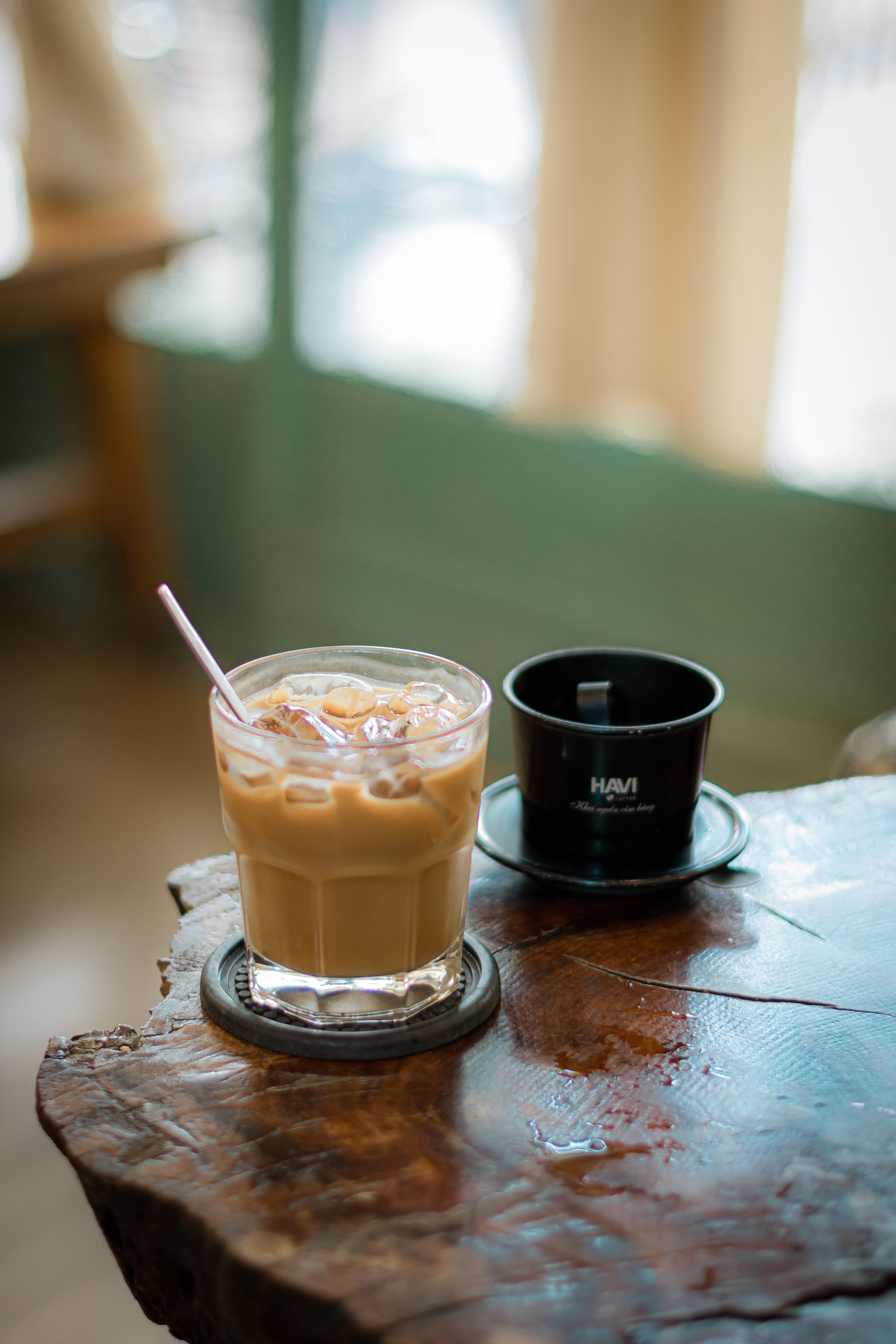 Chilled Iced Coffee on Rustic Café Table · Free Stock Photo