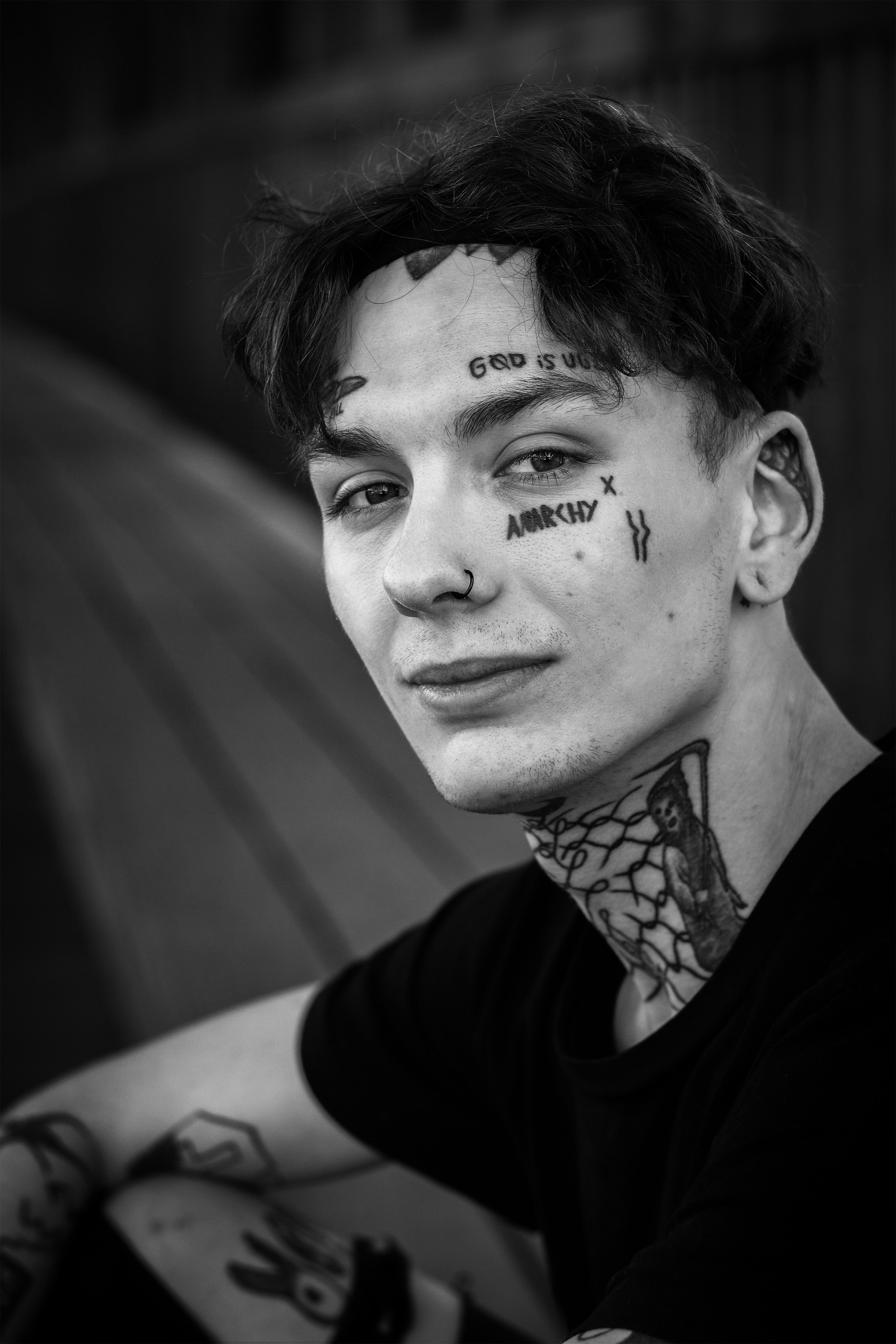 Monochrome Portrait of a Young Tattooed Man · Free Stock Photo