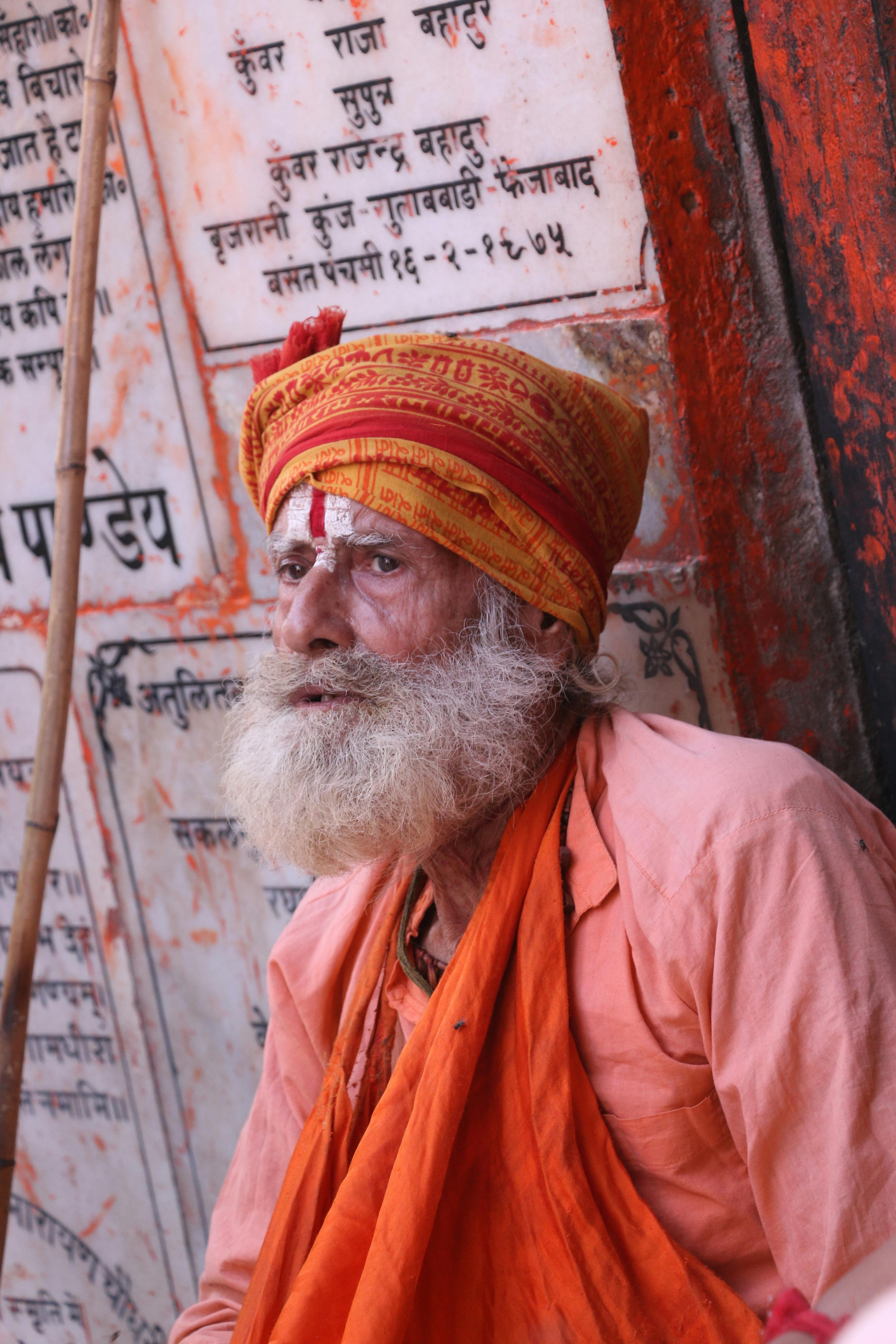 Portrait of Elderly Hindu Sadhu in Orange Robe · Free Stock Photo