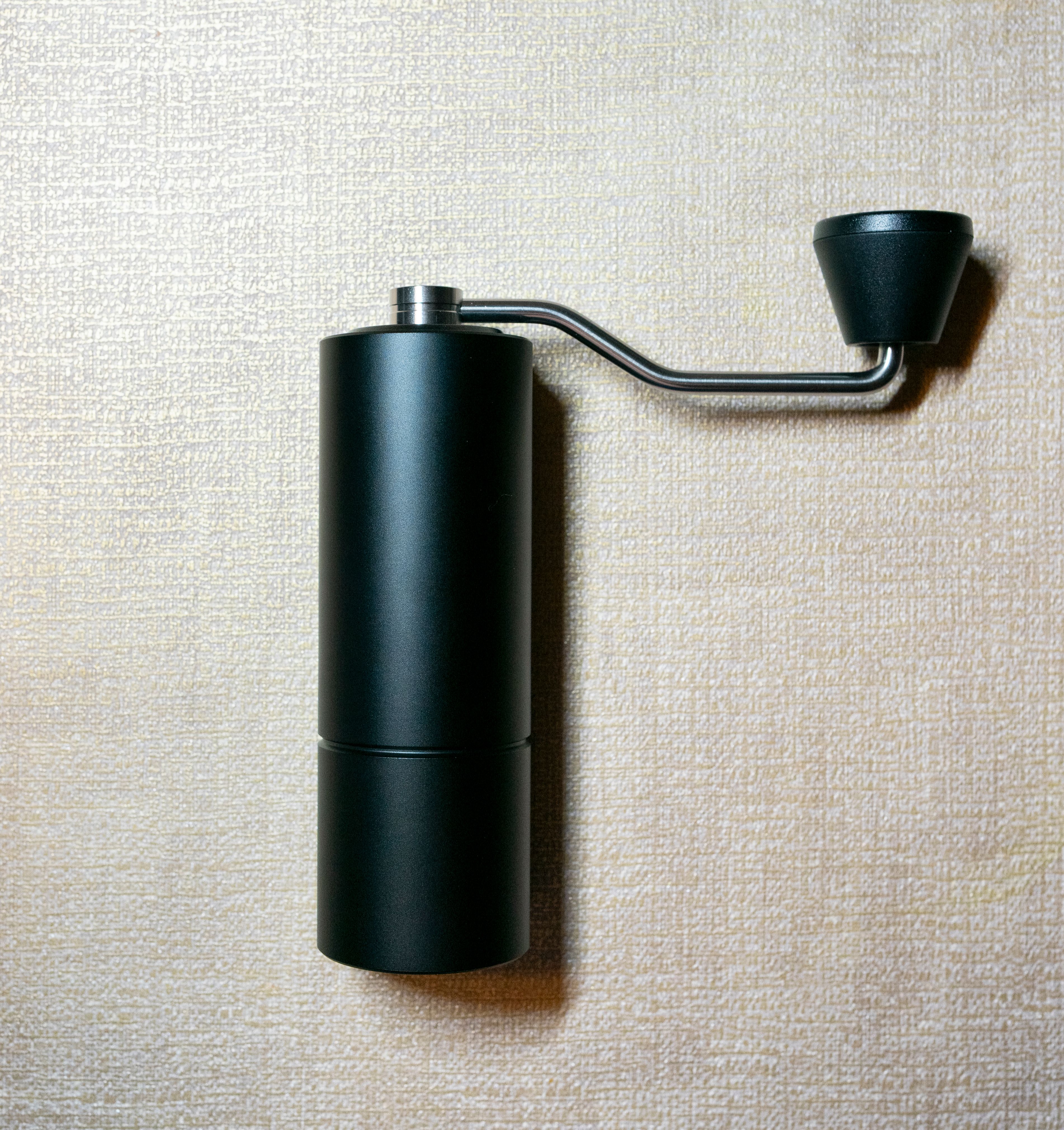 Modern Minimalist Black Coffee Grinder on Textured Surface · Free Stock ...