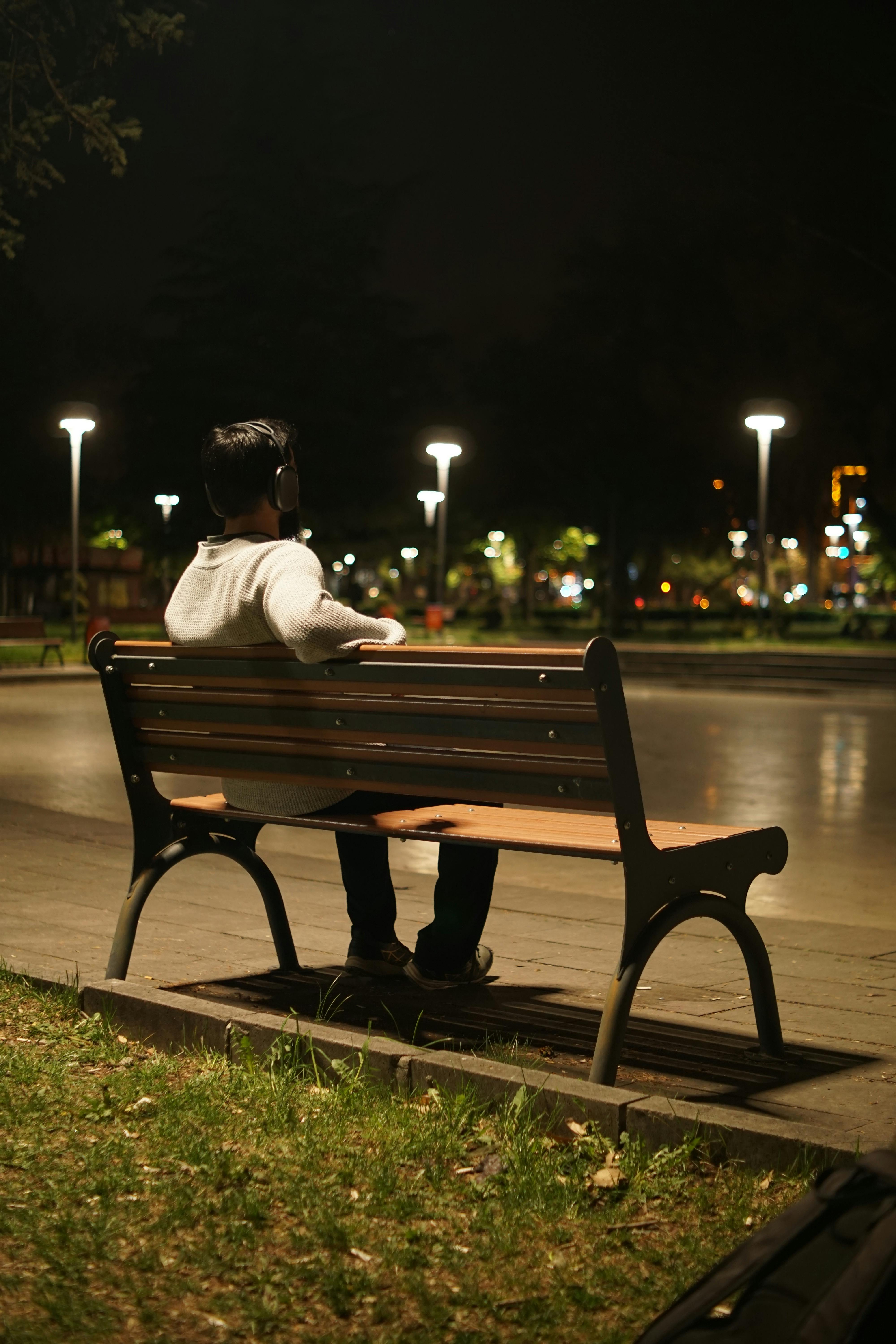 Empty Park Bench at Night Under Streetlights · Free Stock Photo