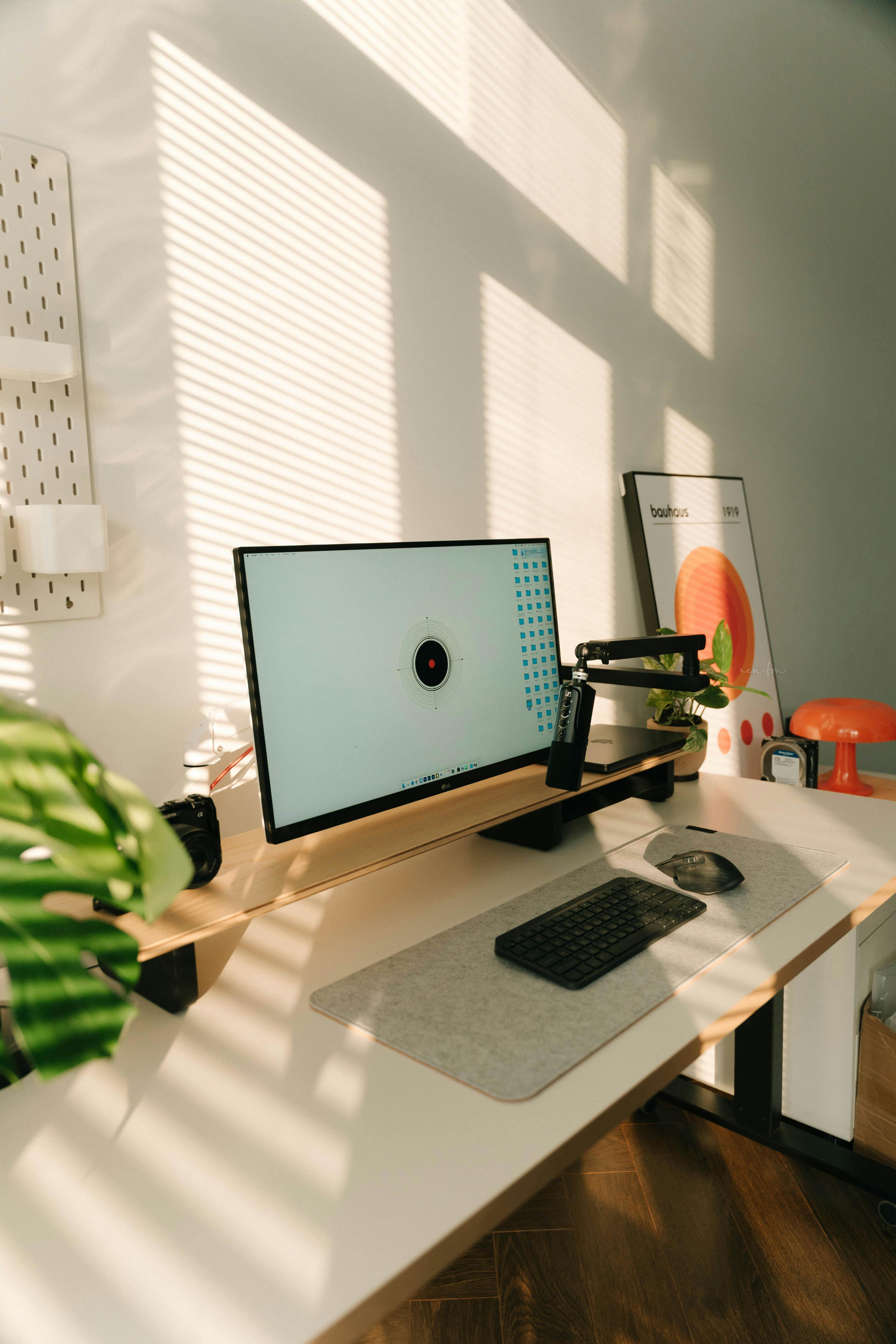 Modern Sunlit Home Office Desk Setup · Free Stock Photo