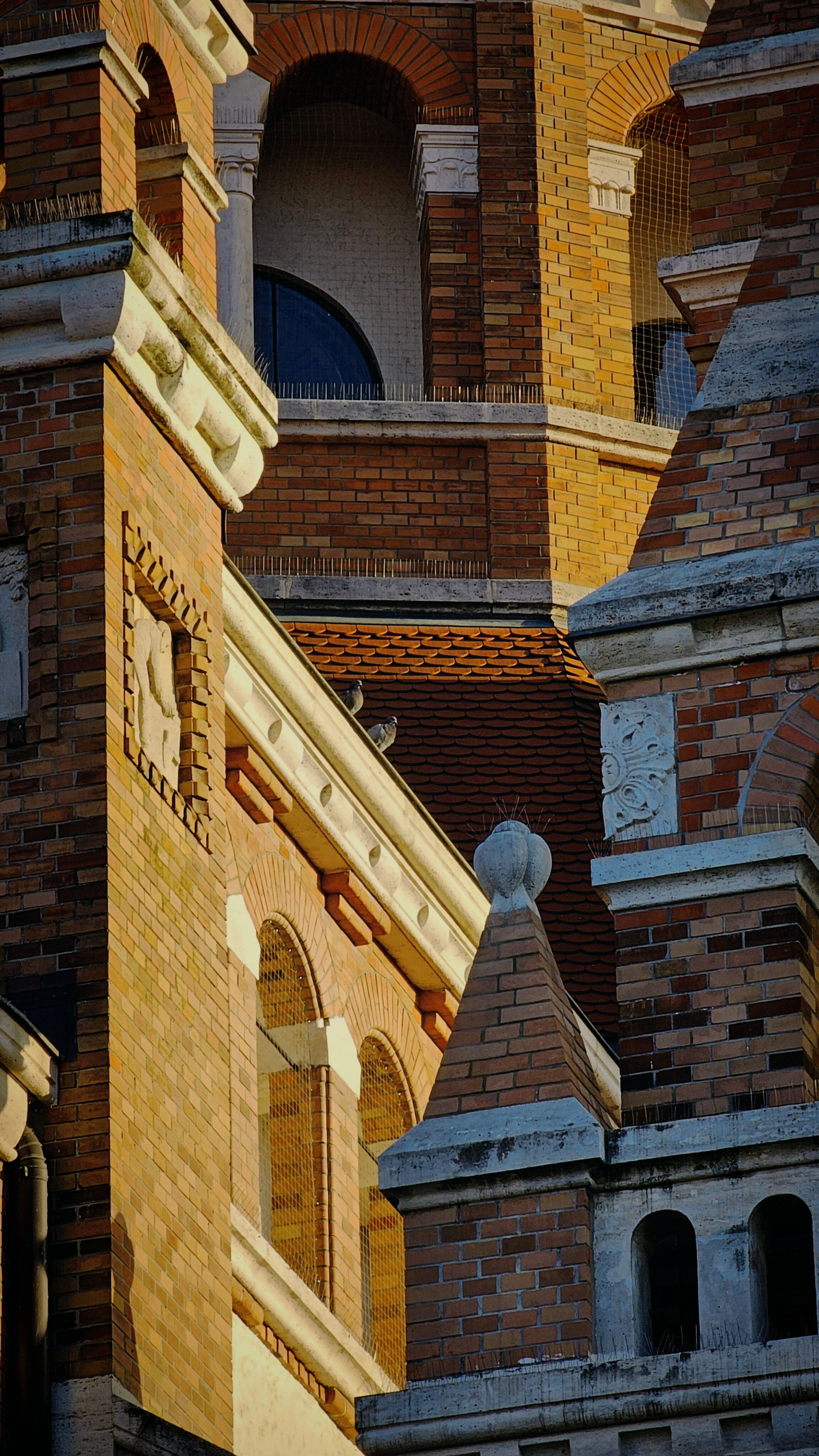 Architectural Detail of Historic Brick Building · Free Stock Photo