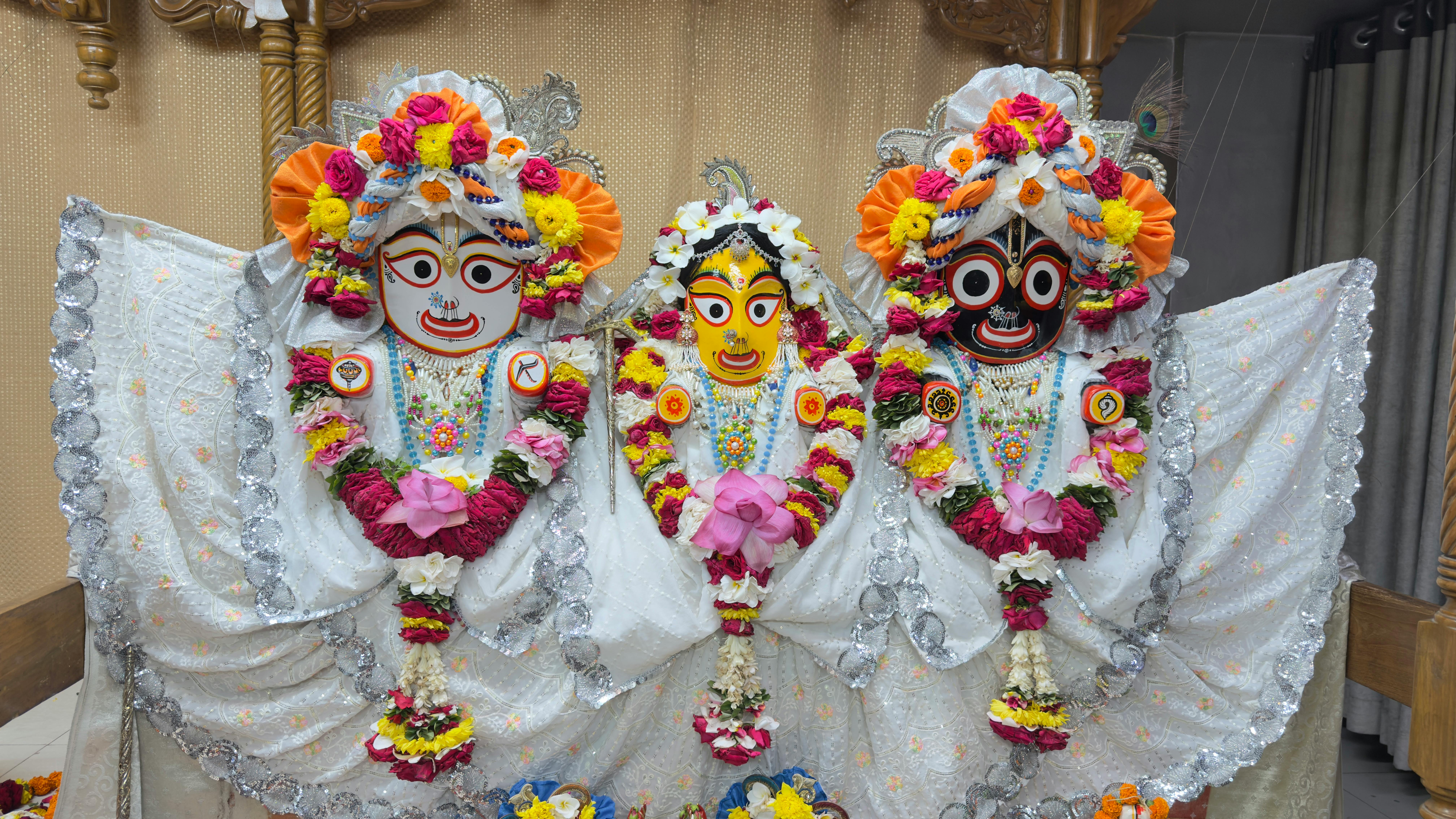 Colorful Jagannath Deities Decorated with Flowers · Free Stock Photo