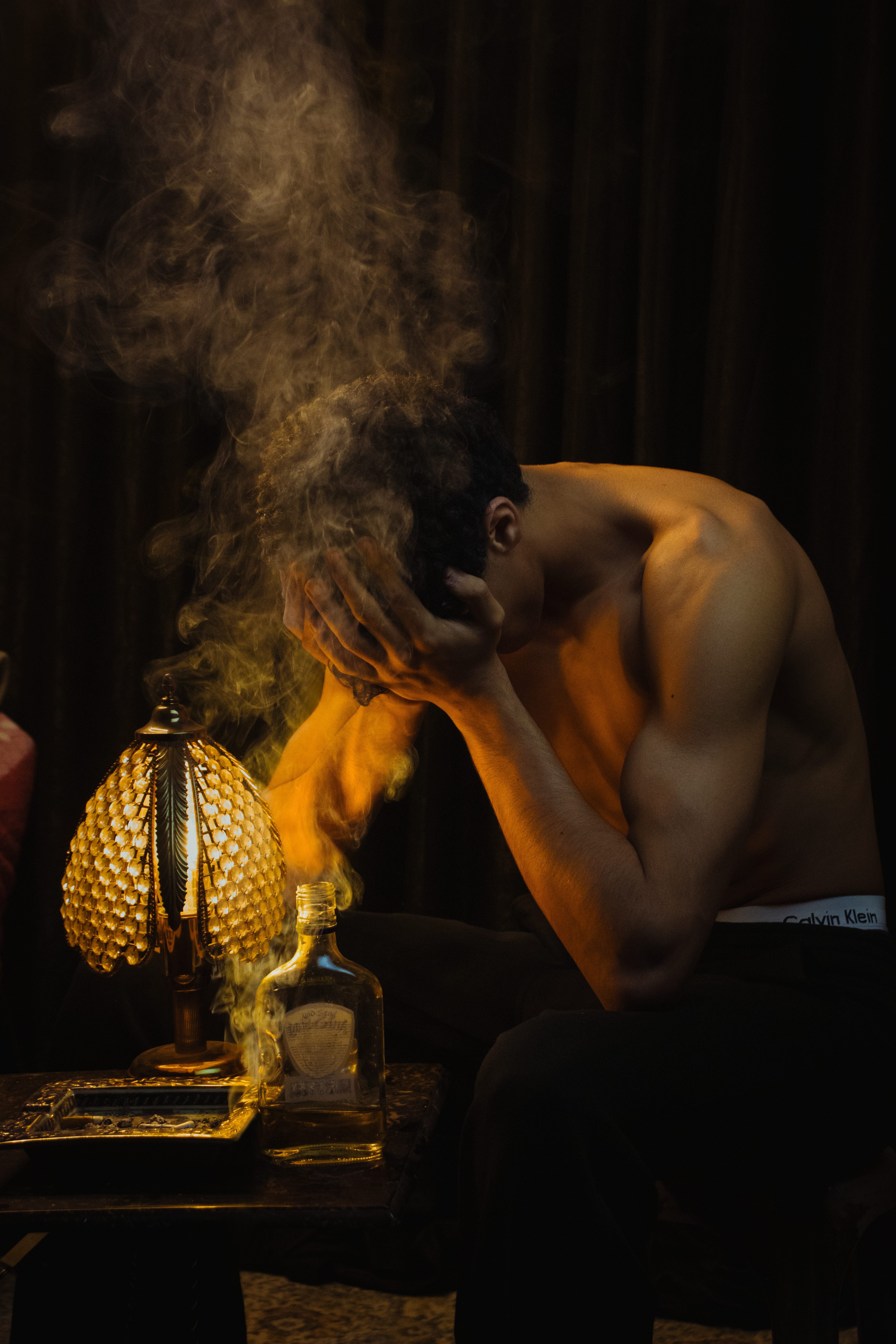 Moody Portrait of a Man in Dark Lighting · Free Stock Photo