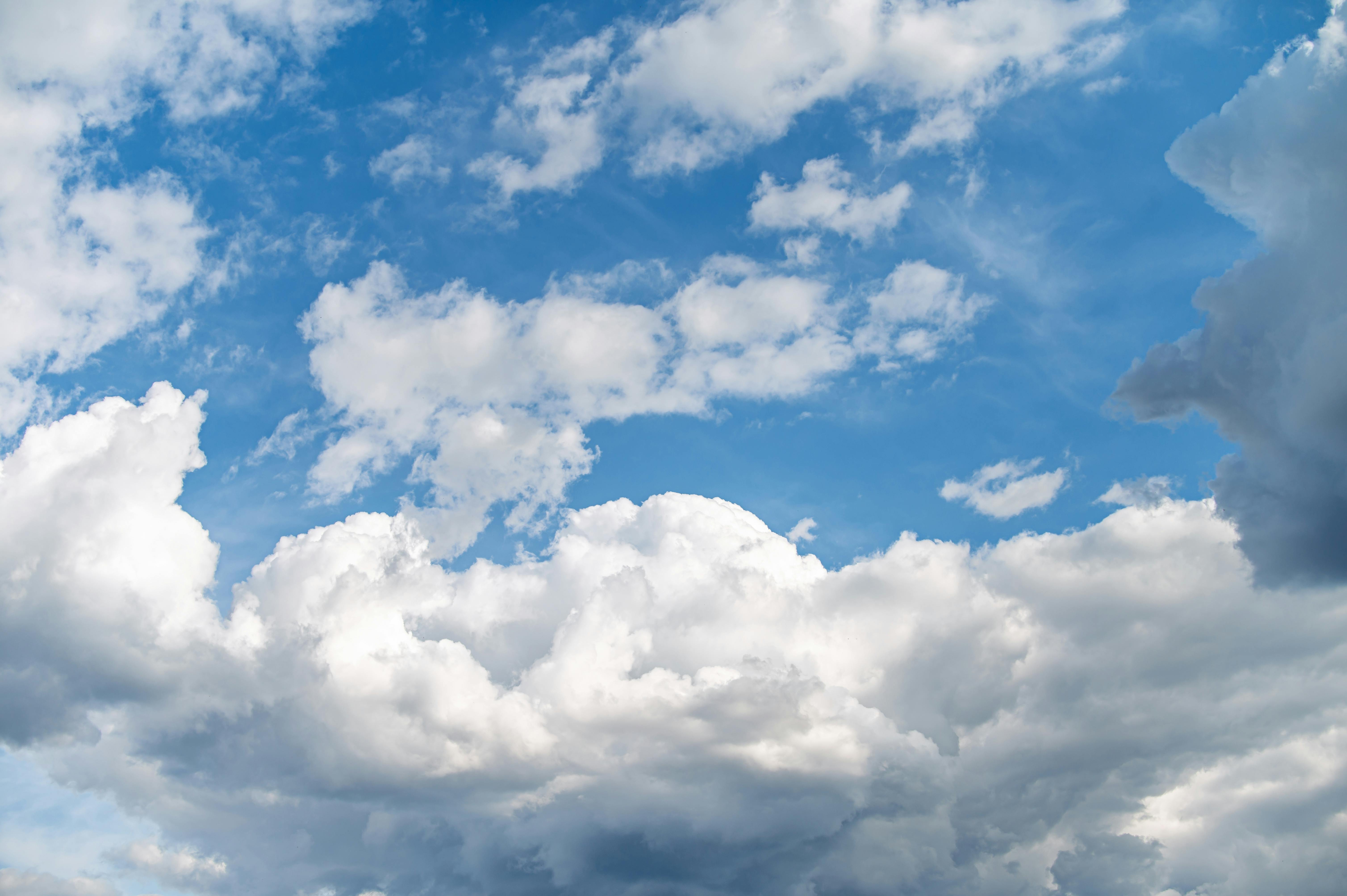 Dramatic Cumulus Clouds in Blue Sky · Free Stock Photo