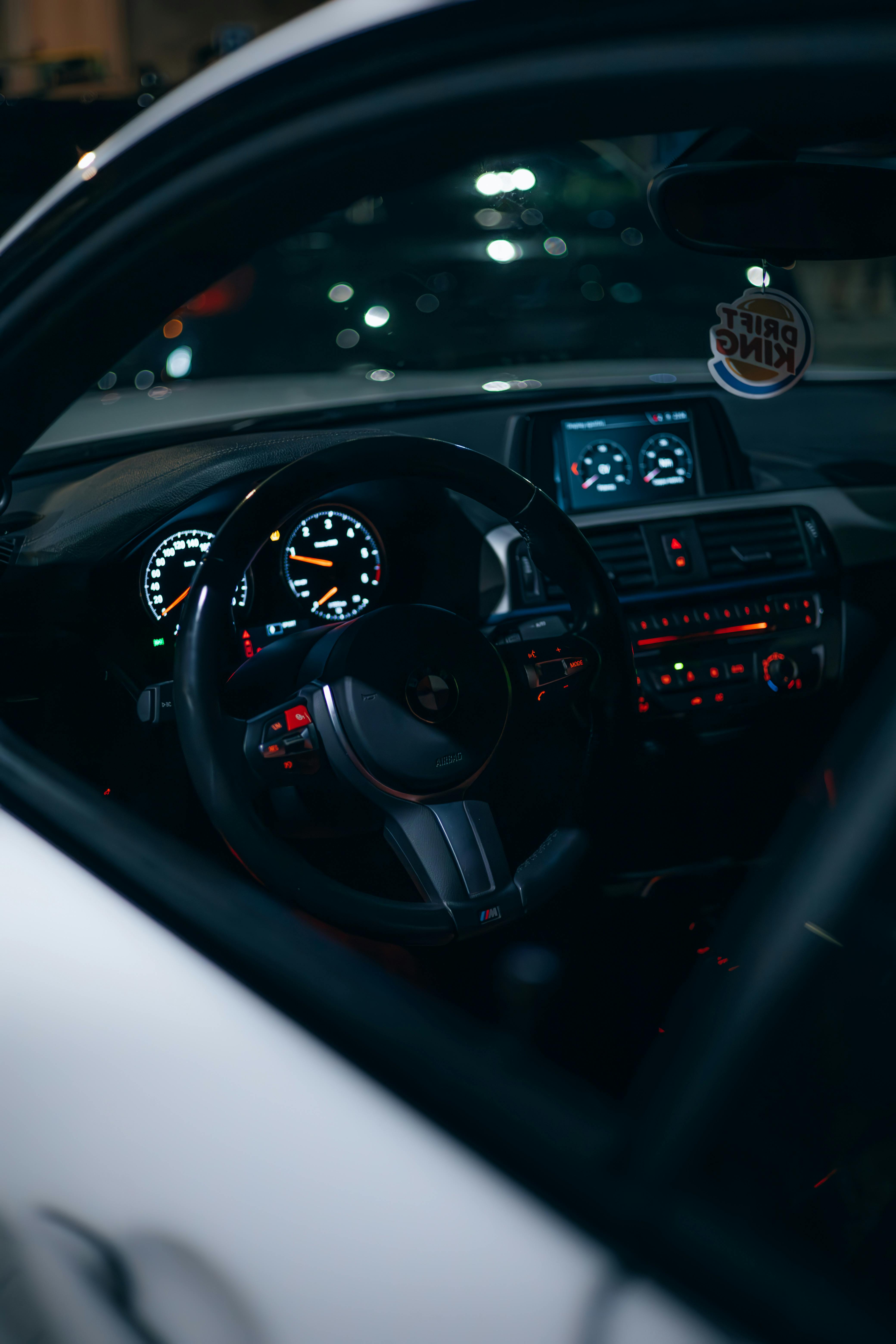 Luxury Car Interior with Futuristic Dashboard Lighting · Free Stock Photo