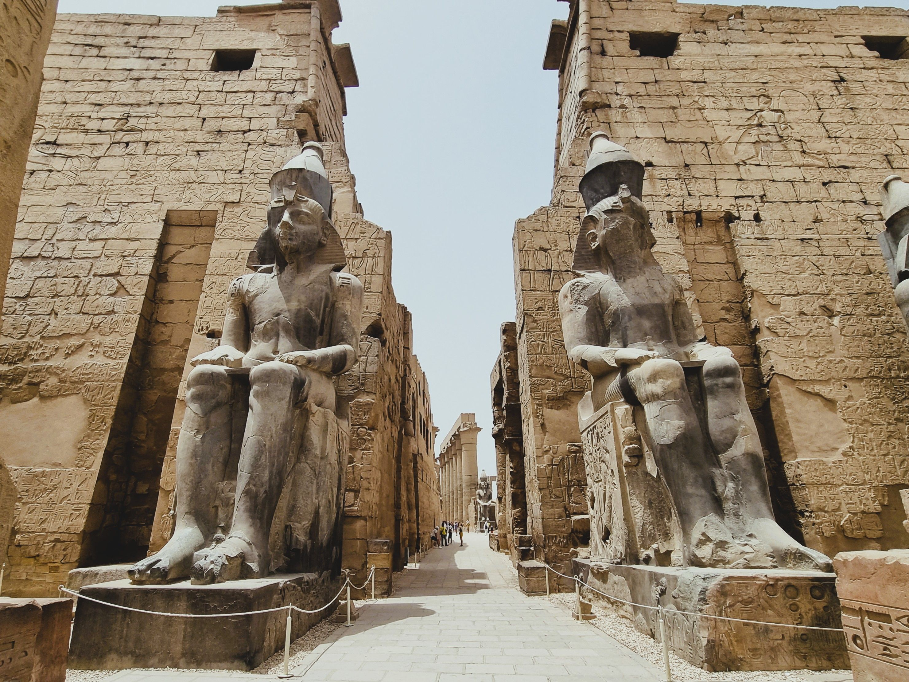 Majestic Statues at Luxor Temple Entrance · Free Stock Photo