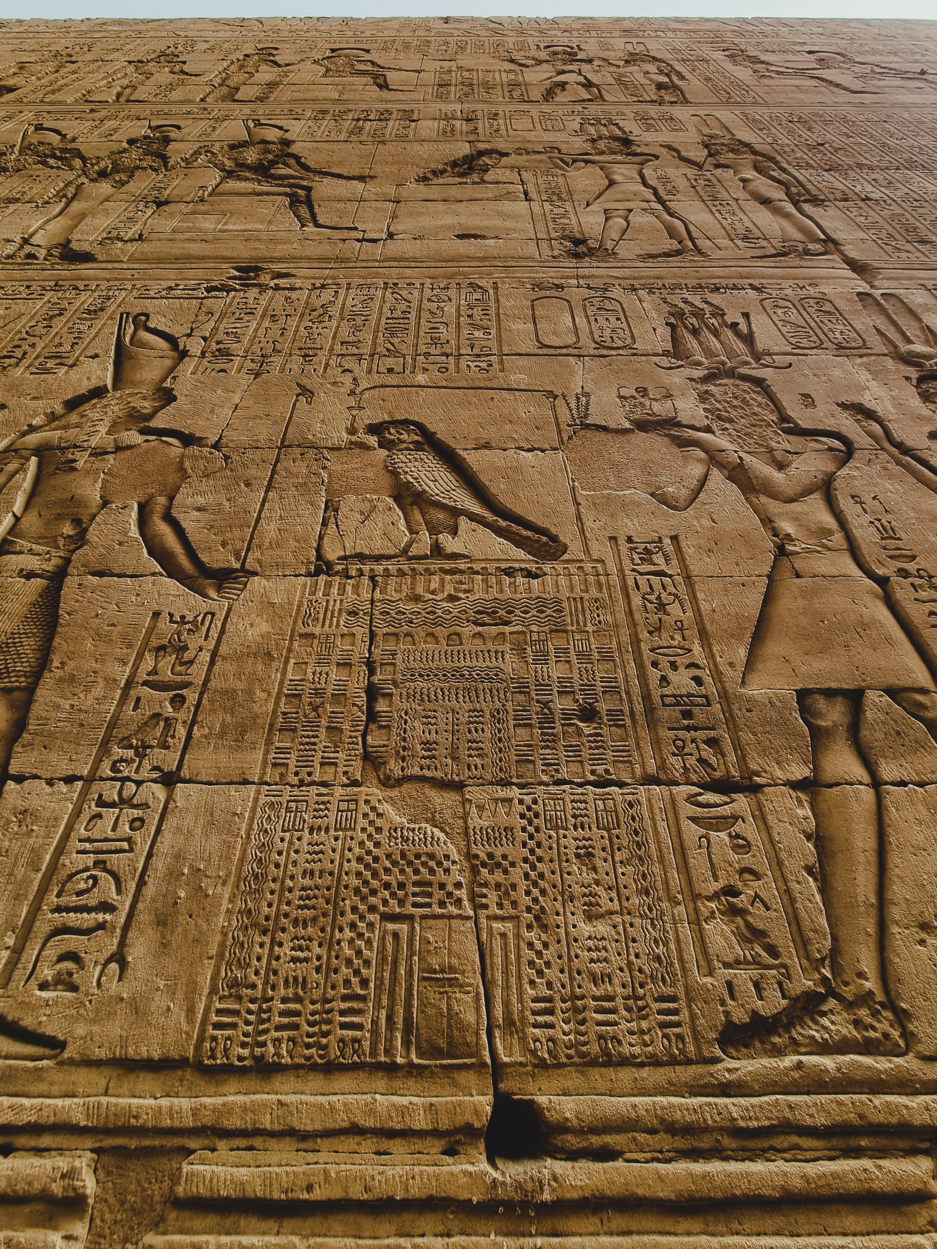 Ancient Egyptian Hieroglyphics on Stone Wall · Free Stock Photo
