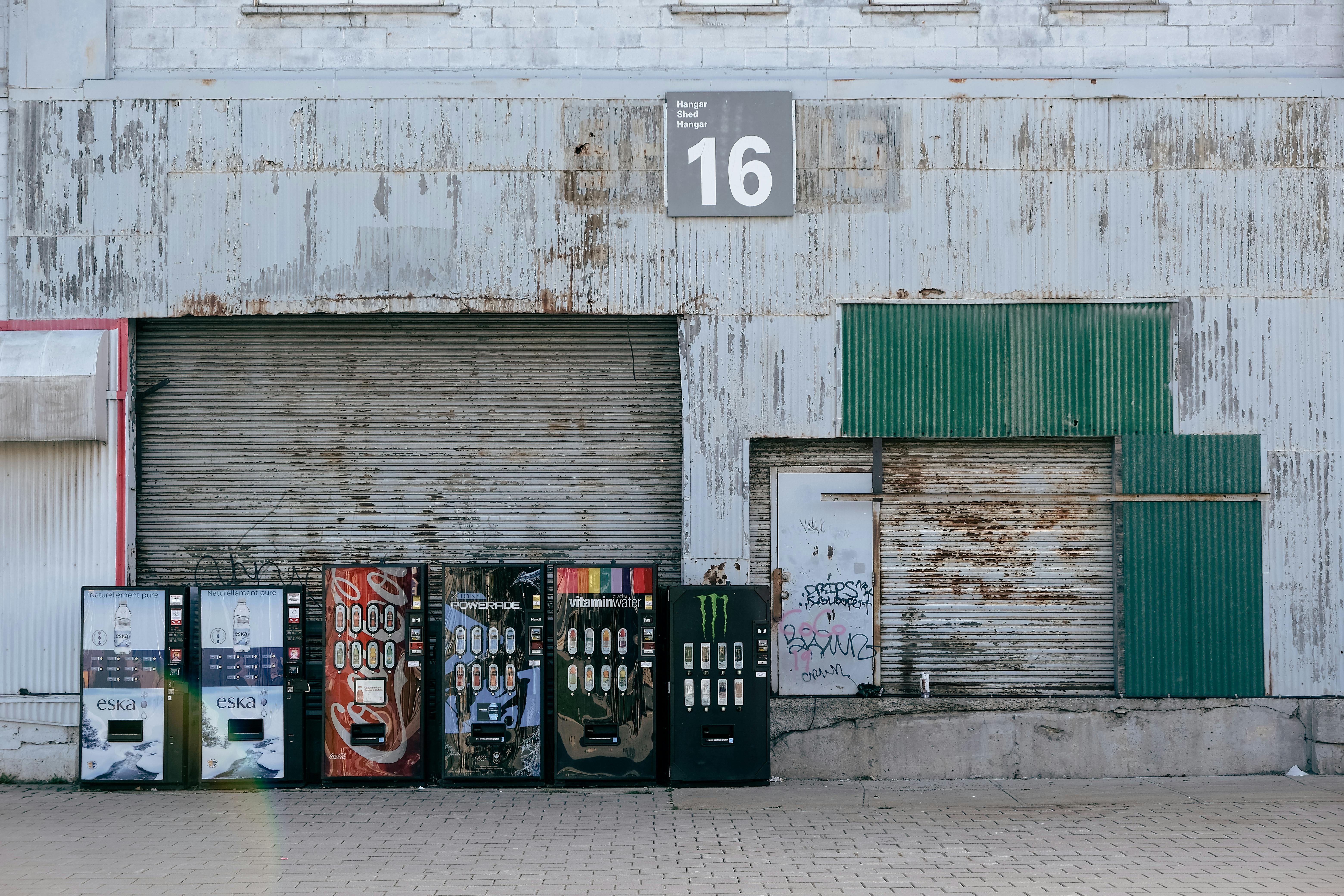 Abandoned Warehouse with Vending Machines · Free Stock Photo