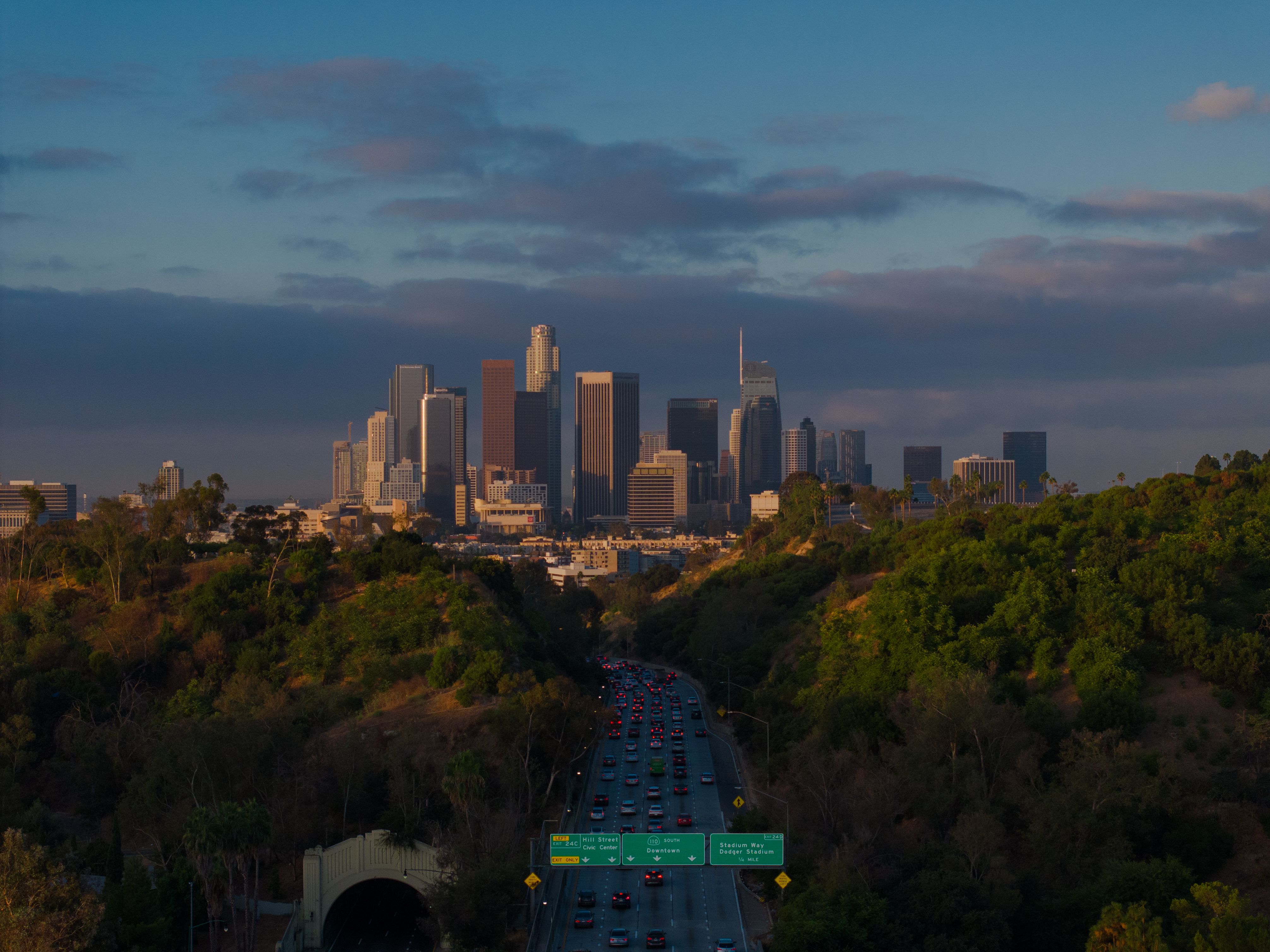Downtown Los Angeles Skyline with Freeway Traffic · Free Stock Photo