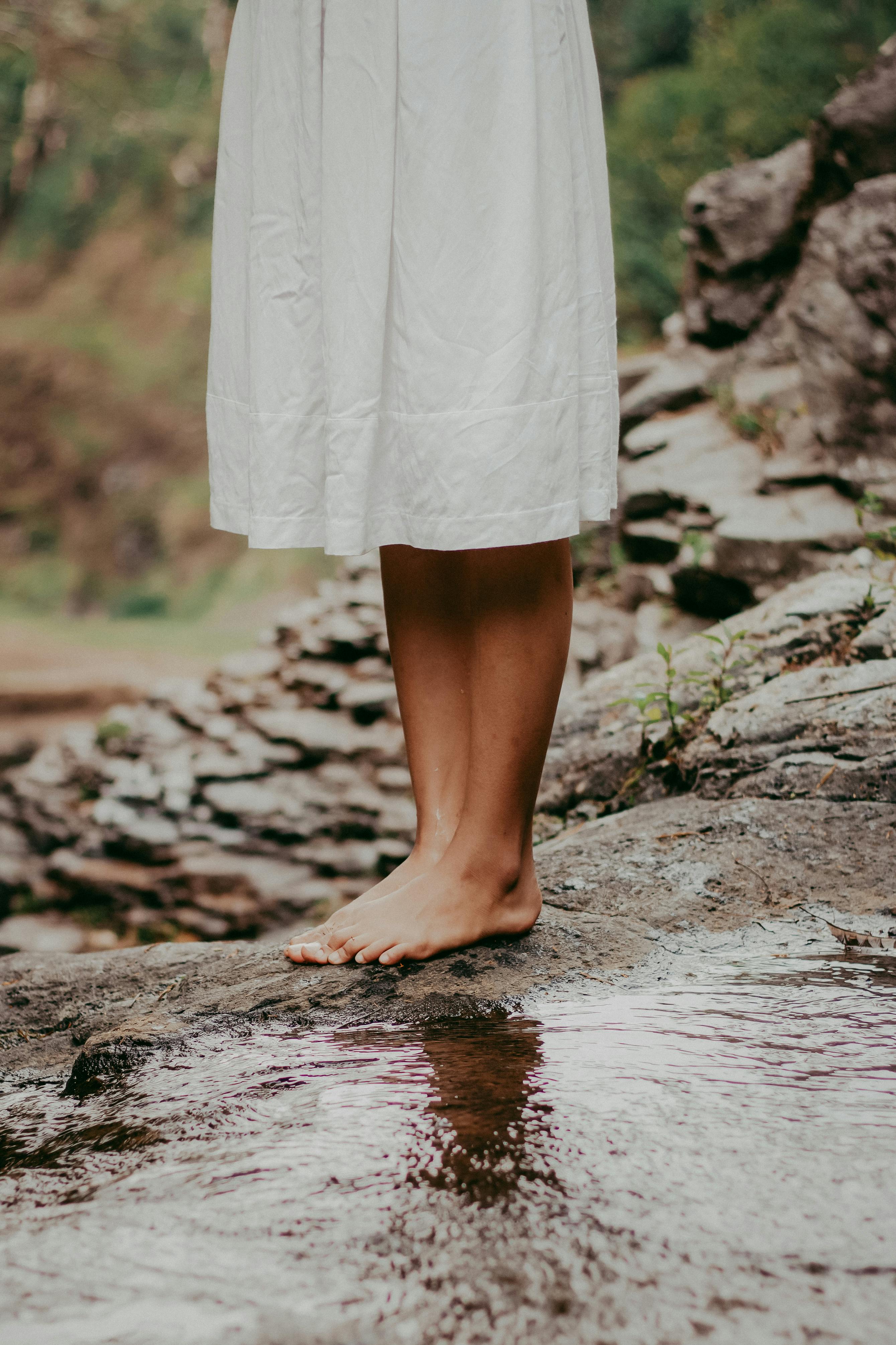 Photo of a Barefoot People Standing · Free Stock Photo