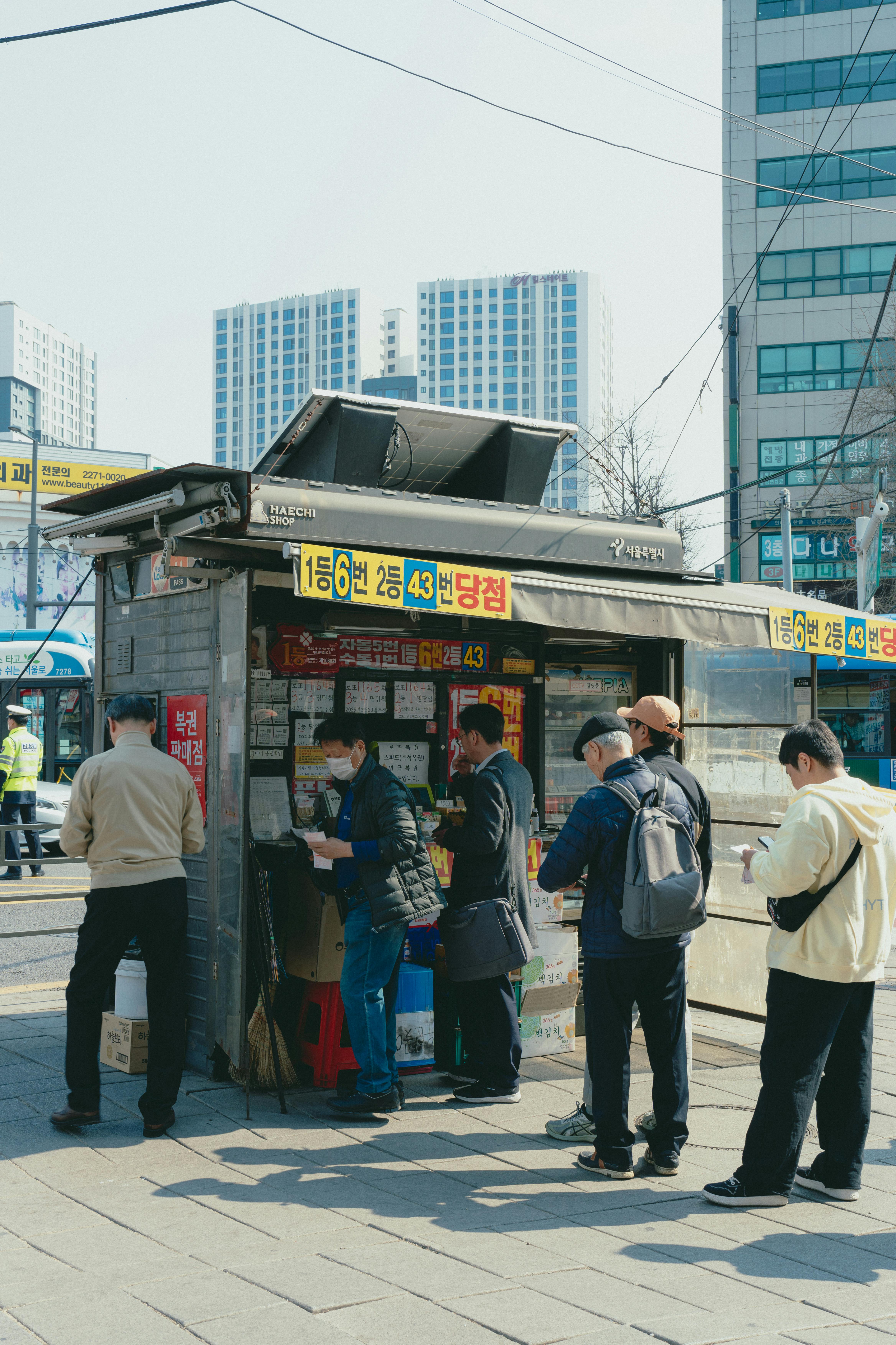 Street Scene at Korean Lottery Stand in Seoul · Free Stock Photo